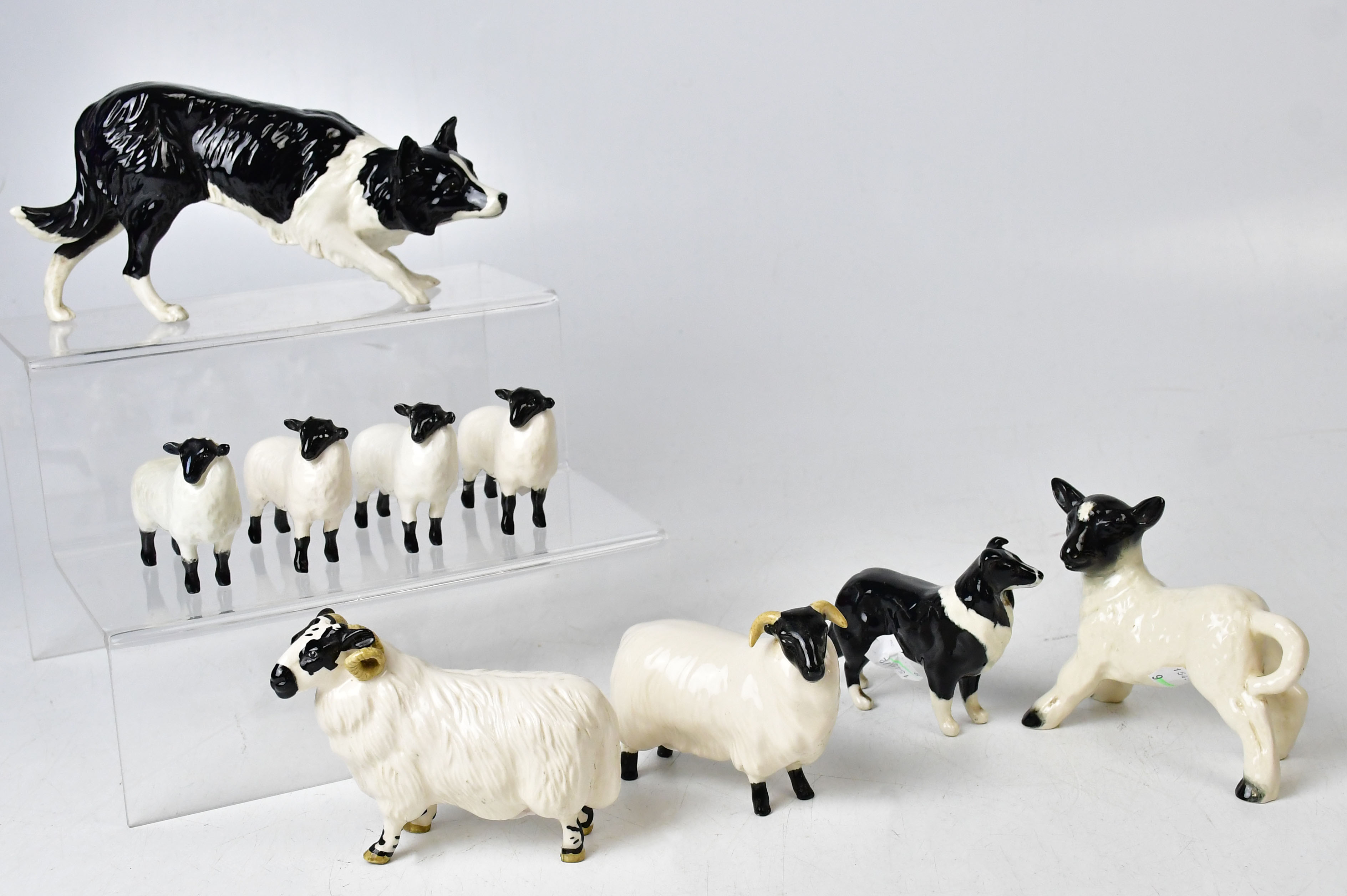 Lot 148 - BESWICK; a collection of six sheep and rams,