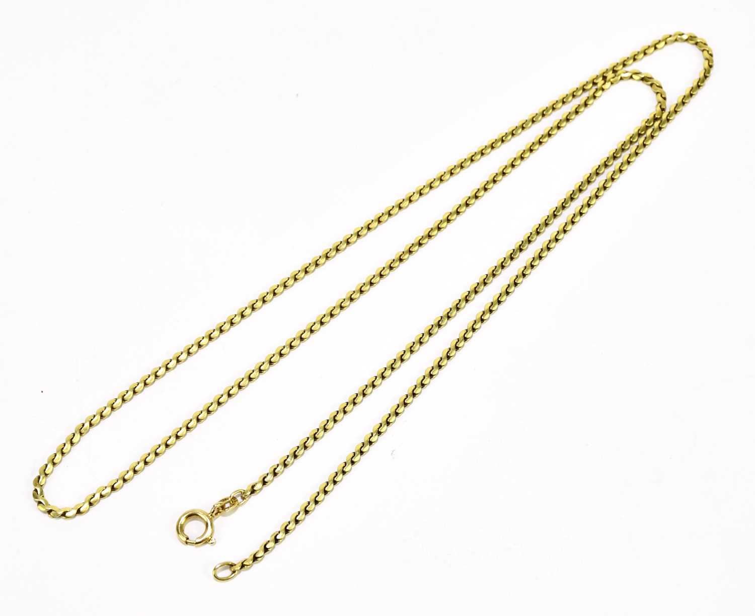 Lot 1318 - A yellow metal fancy link chain, stamped