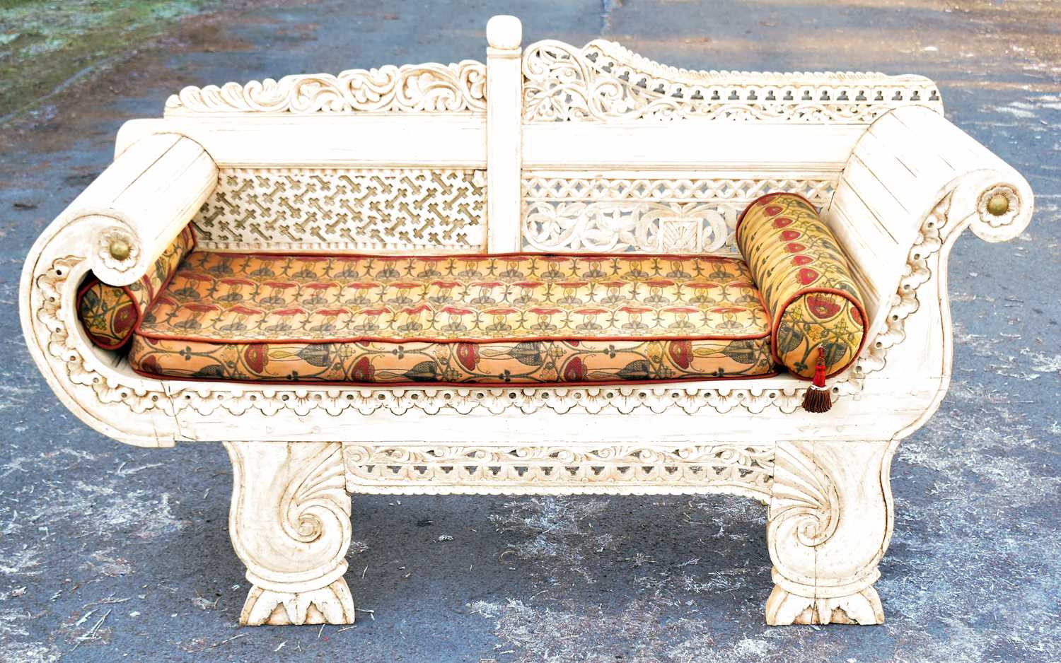 Lot 1736 - An Eastern cream painted hardwood sofa