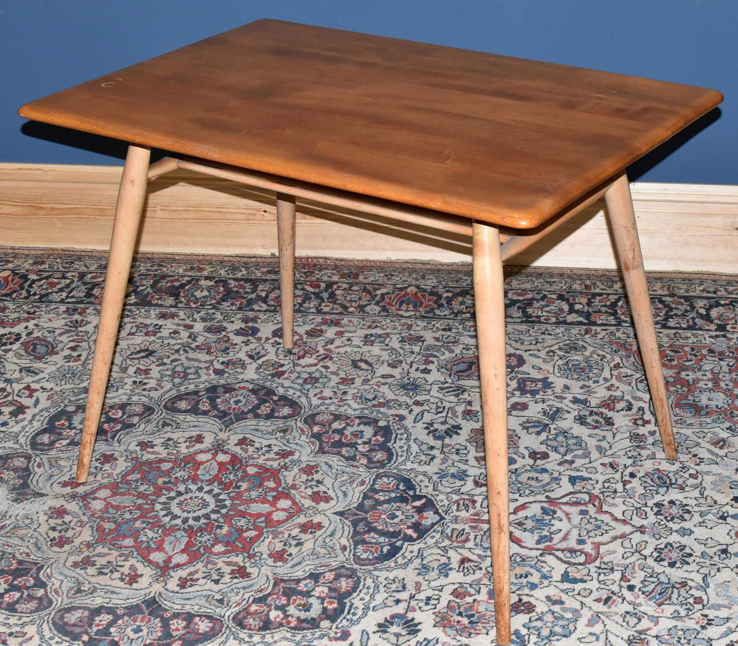 Lot 568 - ERCOL; a light elm side table of rectangular