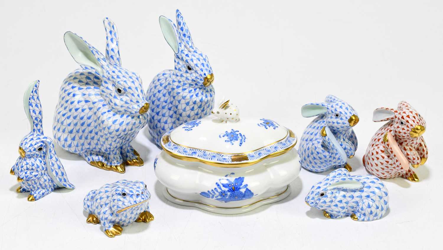Lot 679 - HEREND; six models of rabbits with fishnet