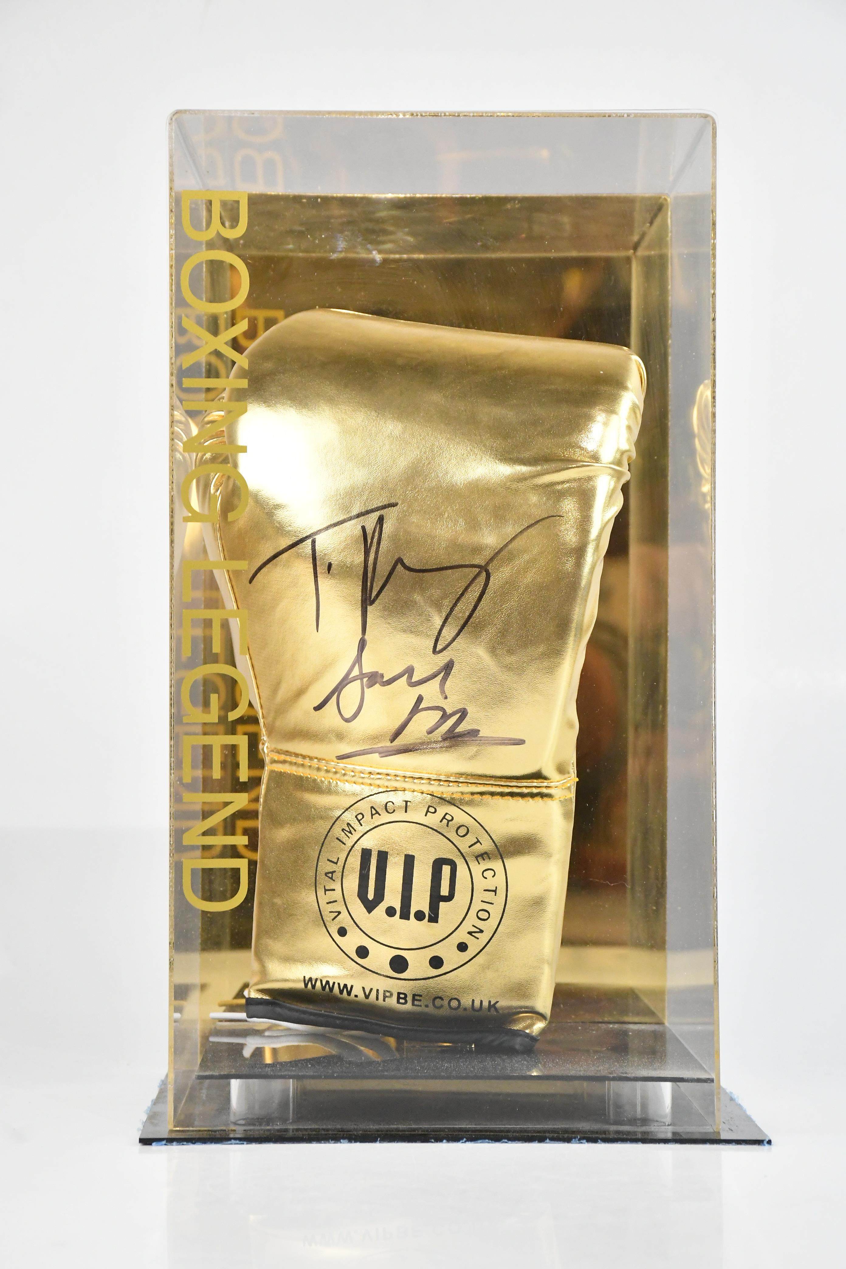 Lot 18 - BOXING INTEREST; a VIP gold boxing glove,