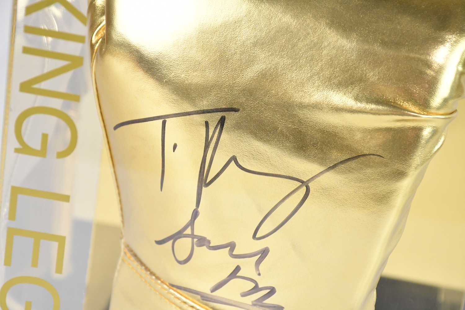 Lot 18 - BOXING INTEREST; a VIP gold boxing glove,