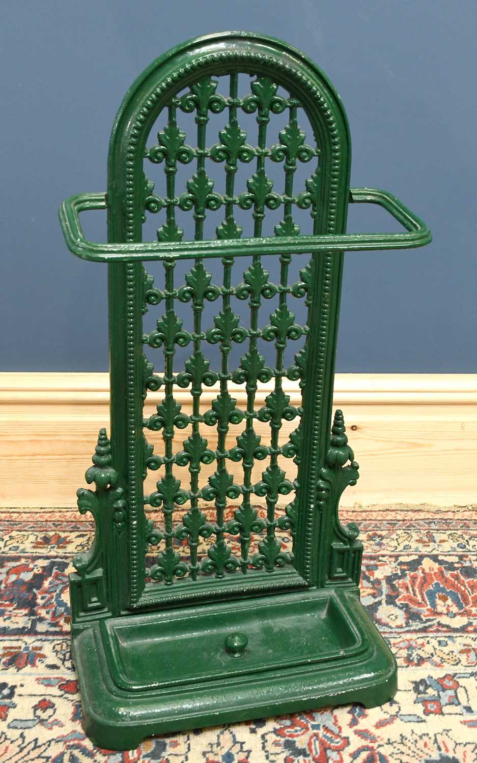 Lot 2736 - A green painted Victorian cast iron stick