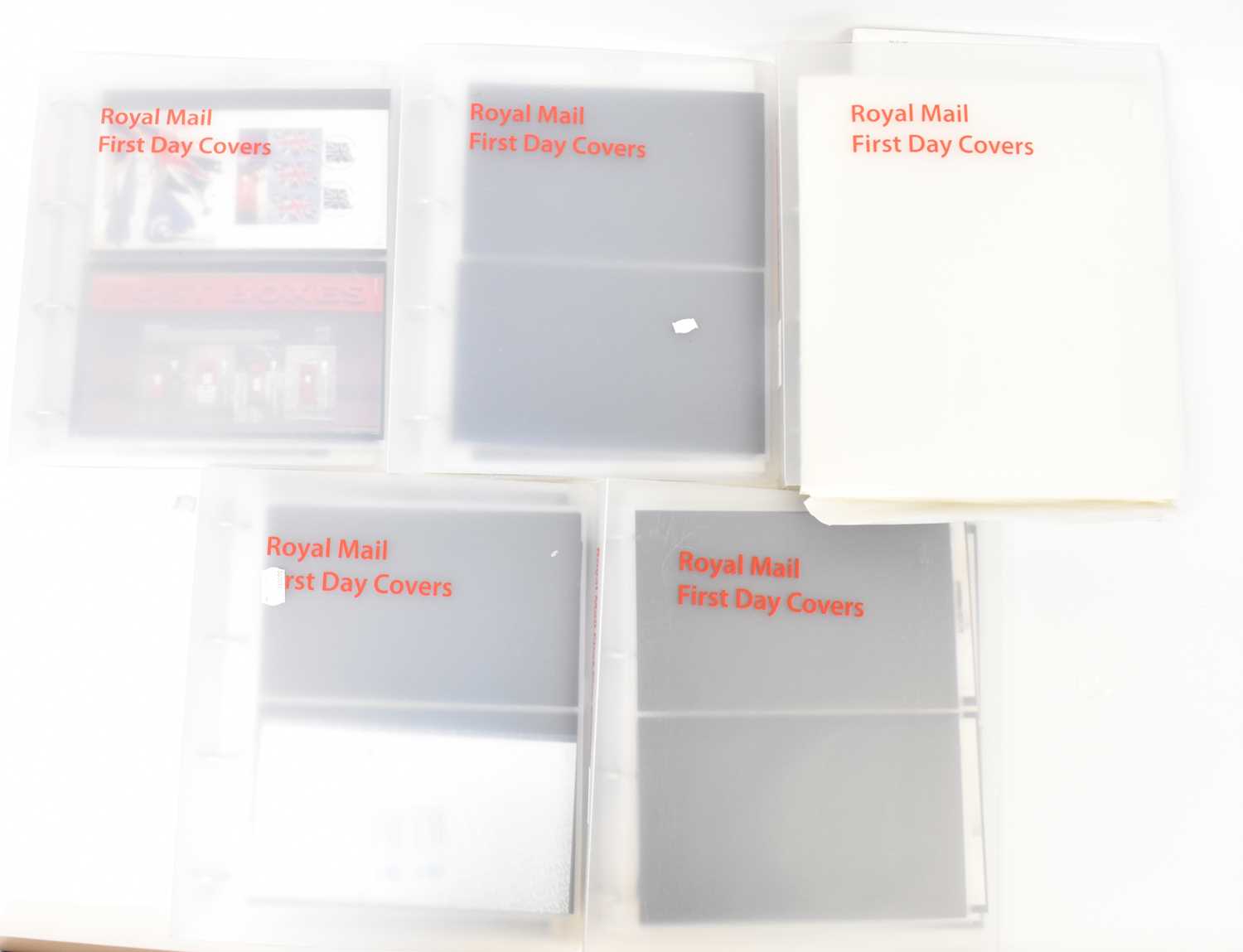 Lot 593 - Five Royal Mail First Day Cover albums with