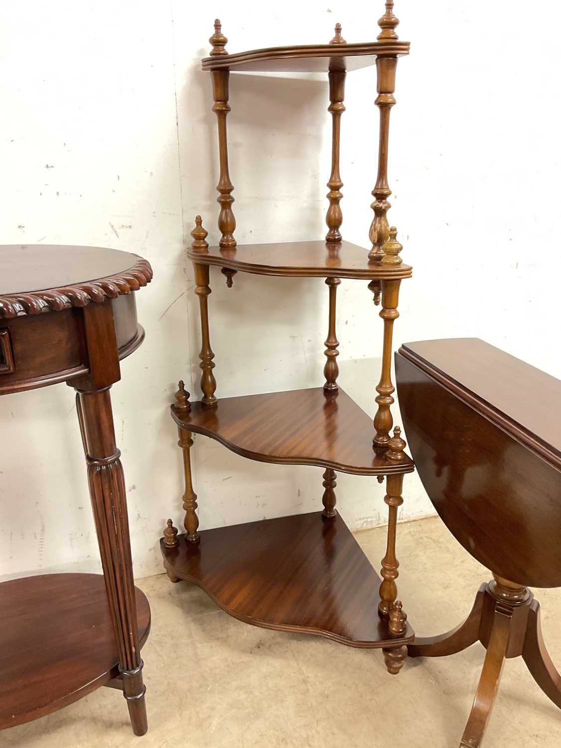 Lot 786 - A four tier whatnot, a reproduction table