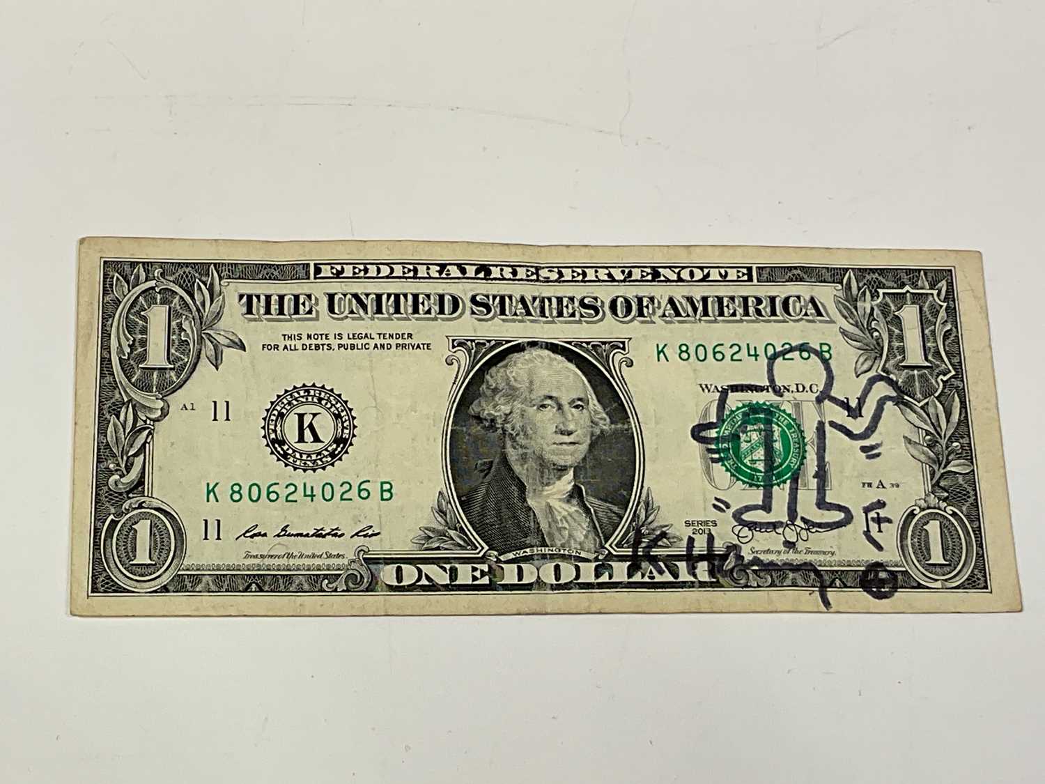 Lot 2271 - KEITH HARING; a one dollar bill bearing the