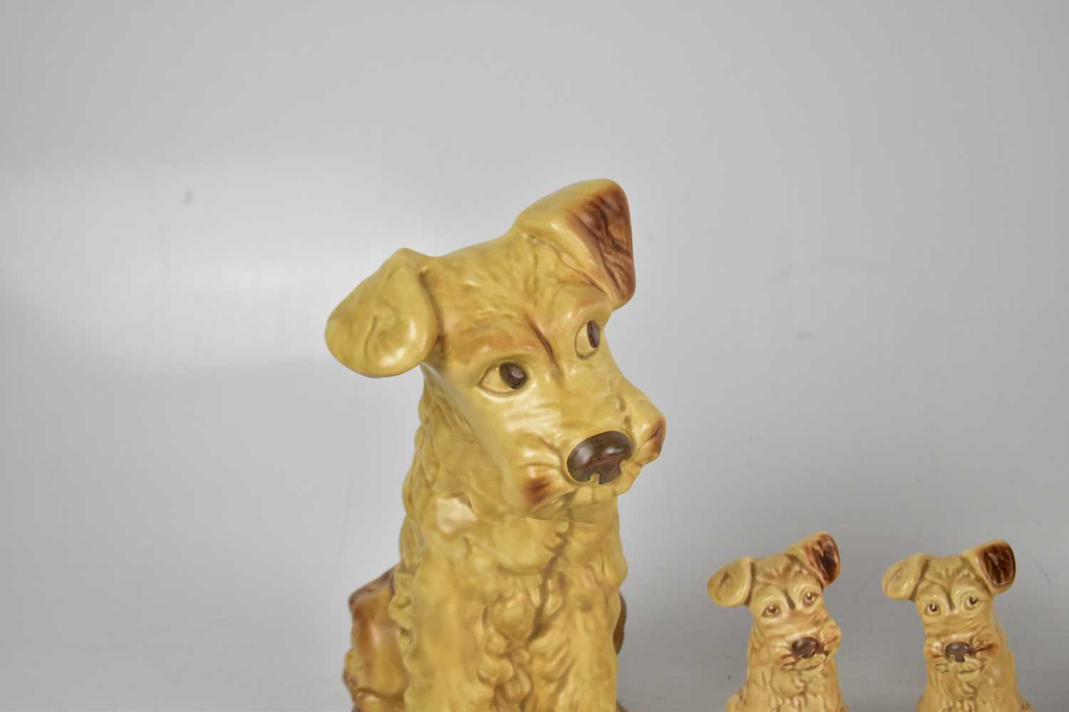 Lot 433 - SYLVAC; two large pairs of seated dogs in a