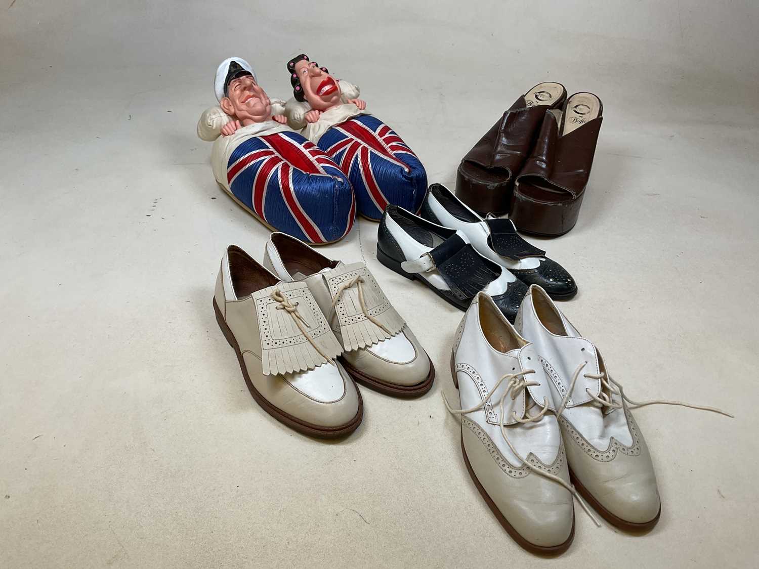 Lot 175 - A pair of Spitting Image slippers of Queen