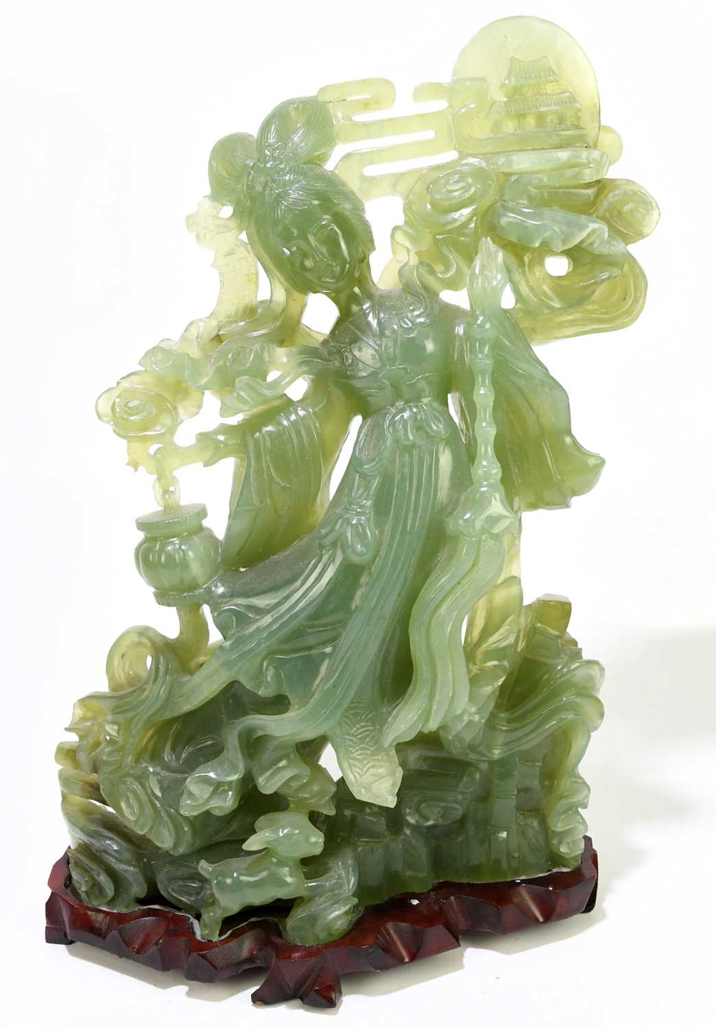 Lot 2144 - A large Chinese green hardstone carving of
