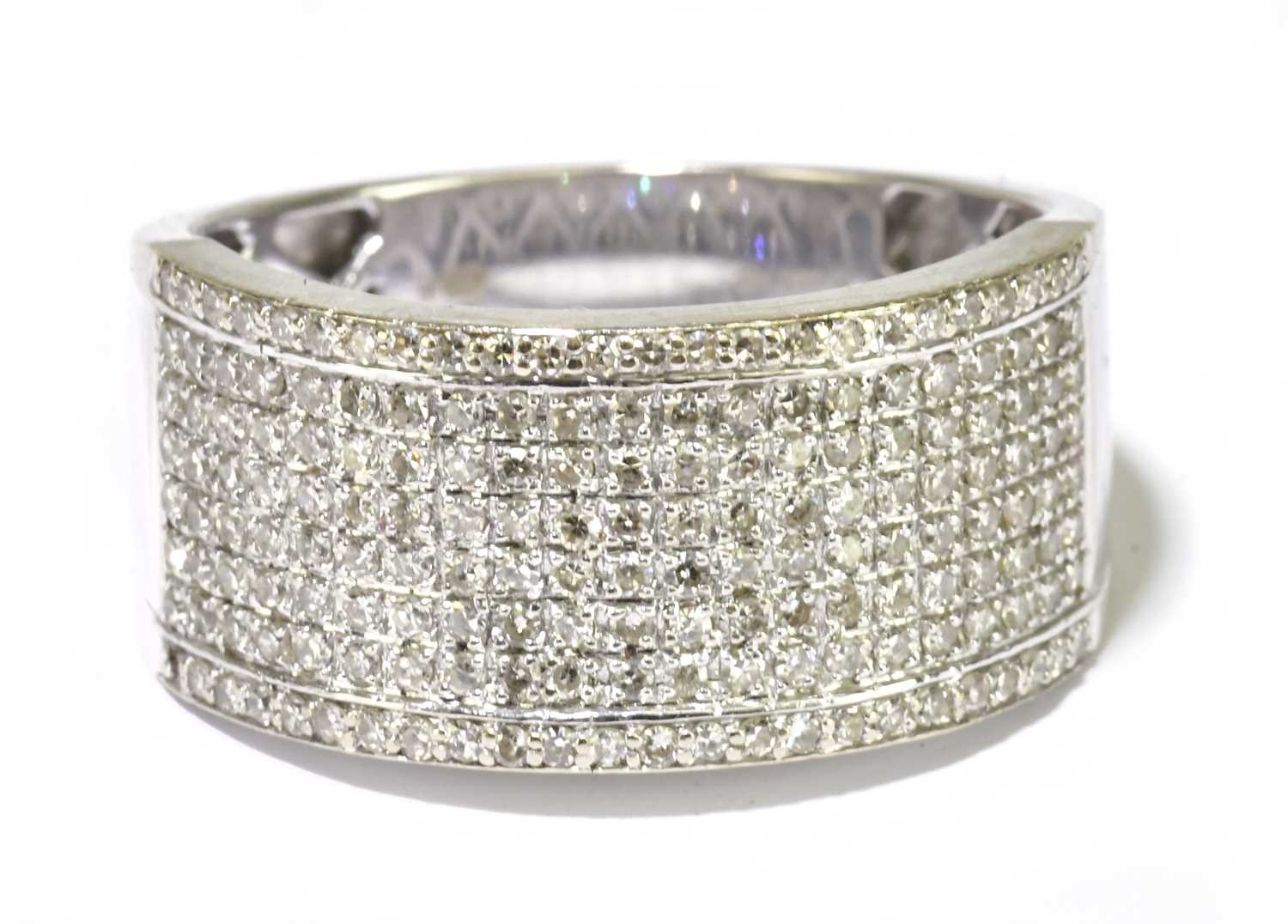 Lot 41 - A large 18ct white gold pave diamond set ring,