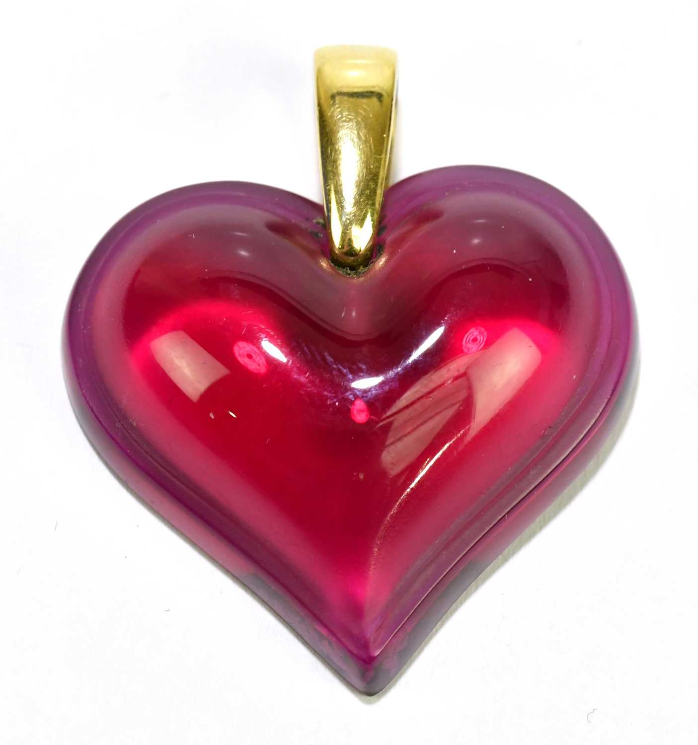 Lot 273 - LALIQUE; a heart shaped ruby glass pendant