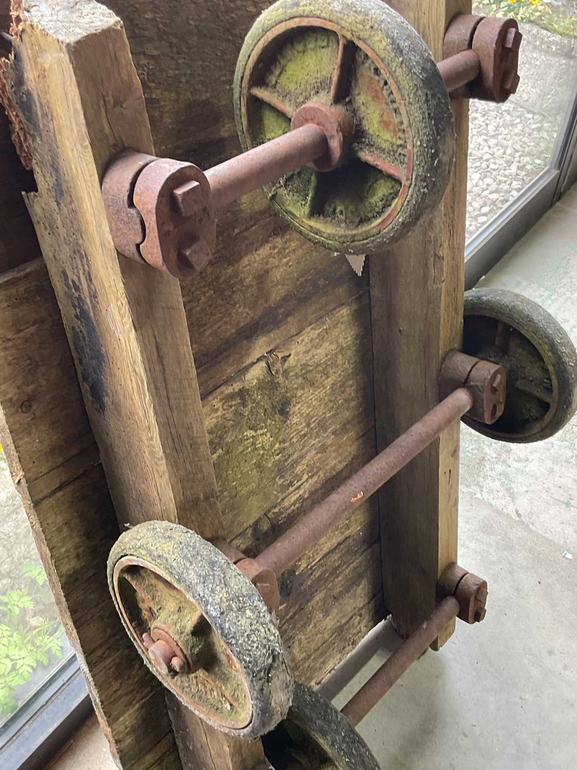 Lot 666 - An early plank trolley, with wheels marked H.