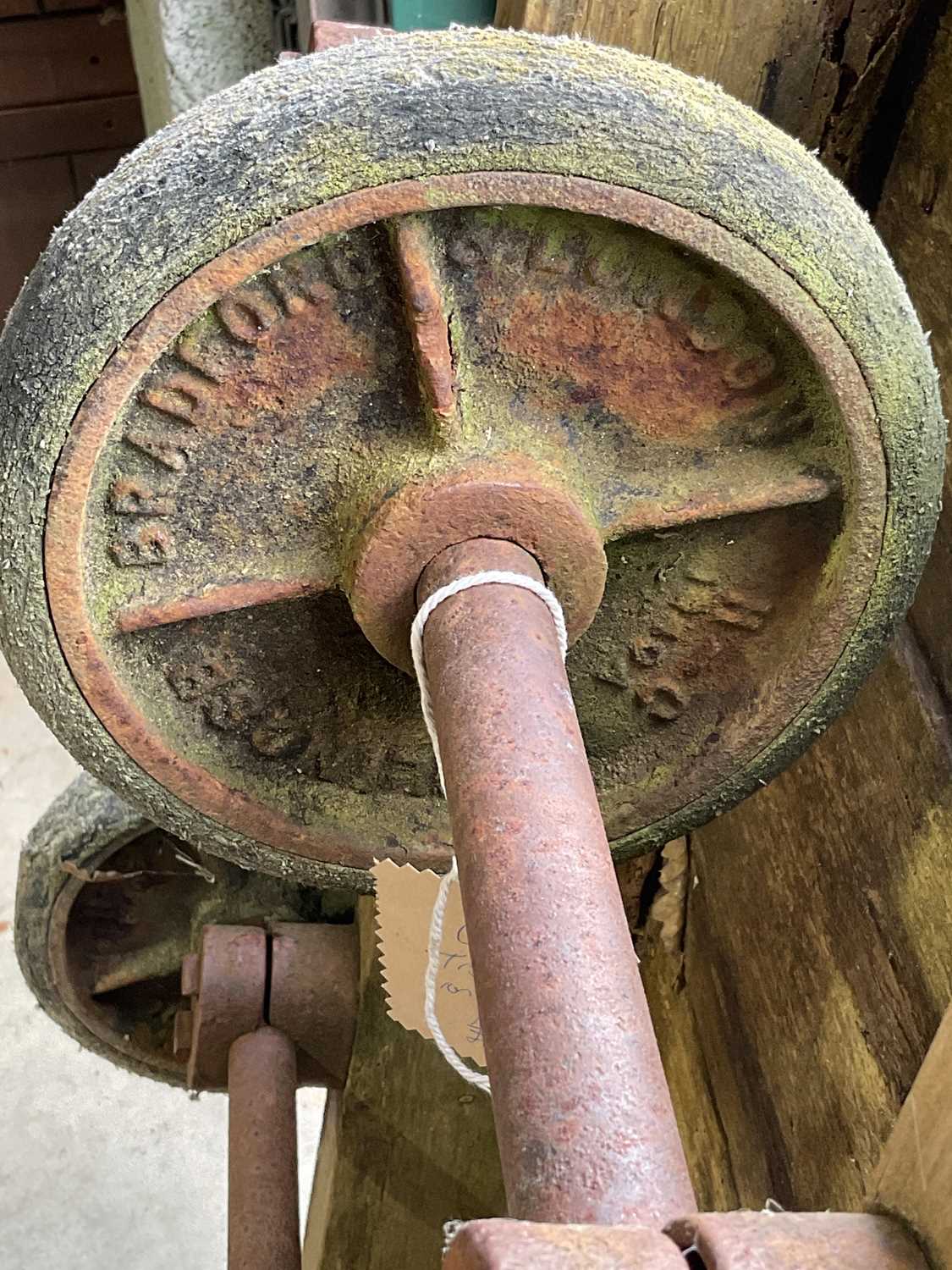 Lot 666 - An early plank trolley, with wheels marked H.