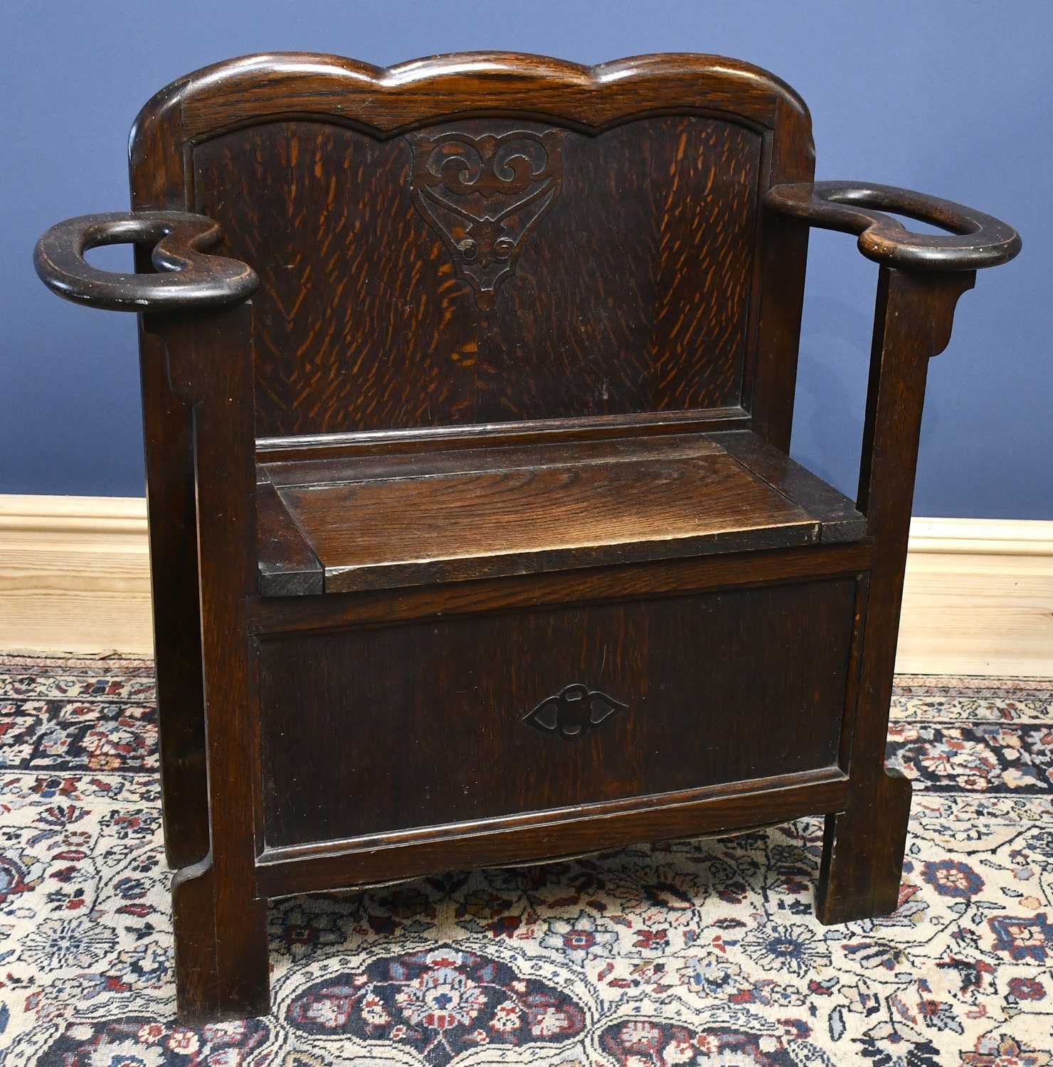 Lot 2904 - A 1930s oak hall seat, with umbrella