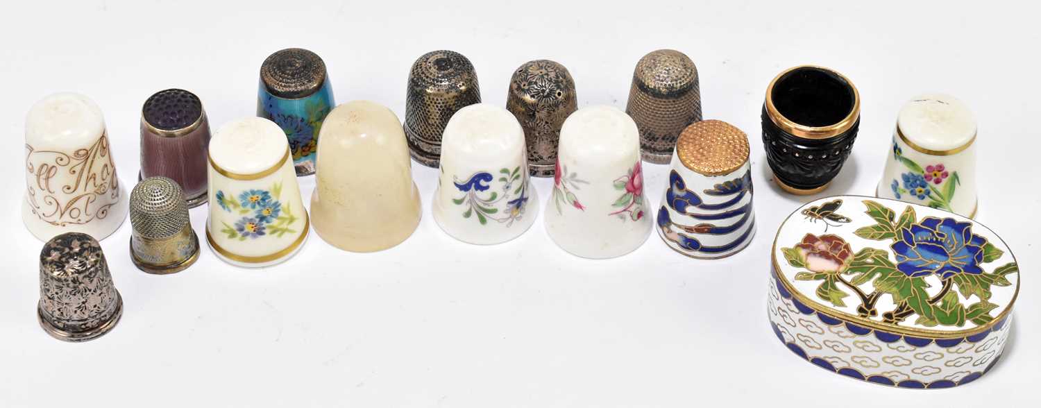 Lot 94 - A group of thimbles including three