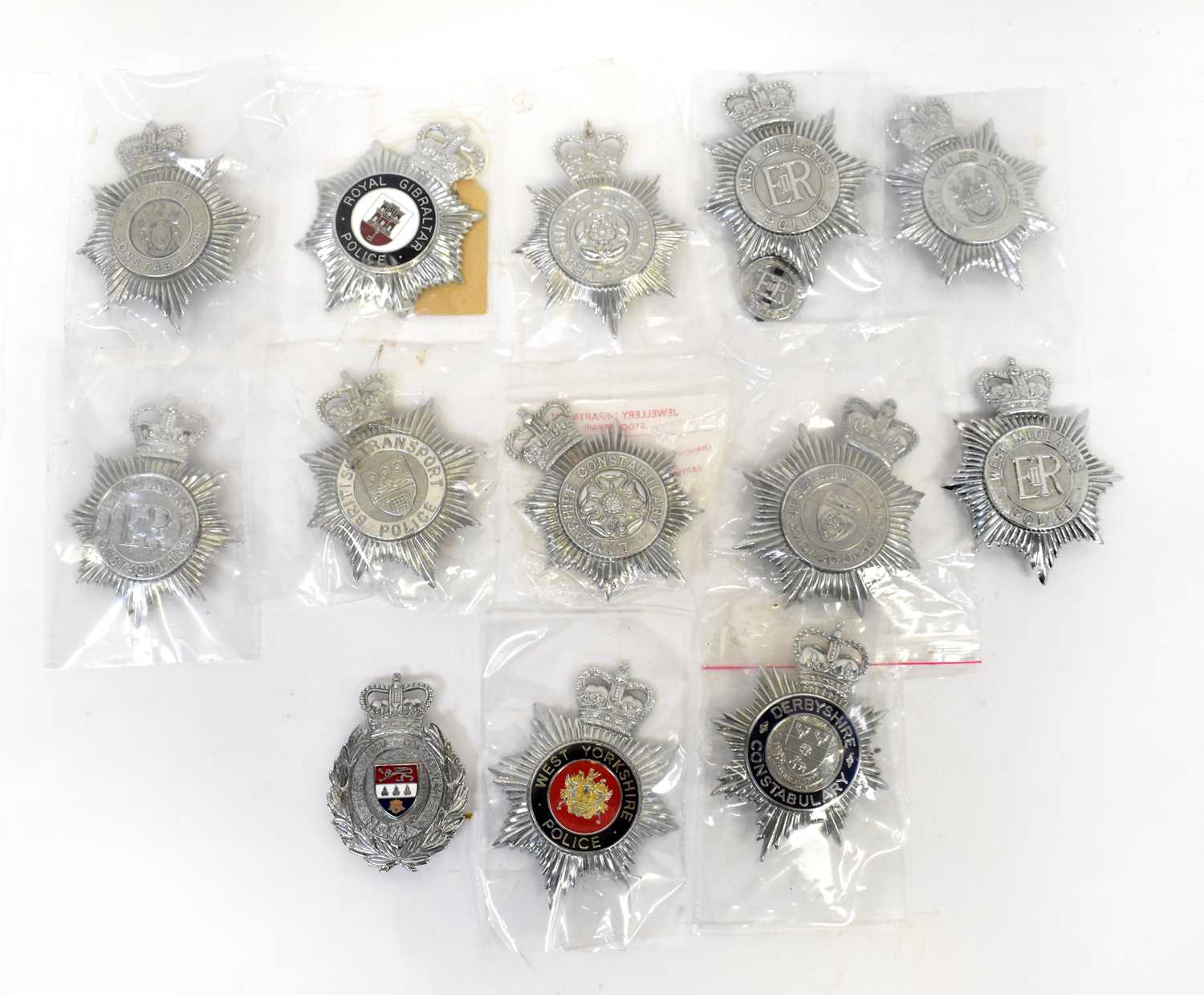 Lot 185 - Thirteen Elizabeth II Police badges to