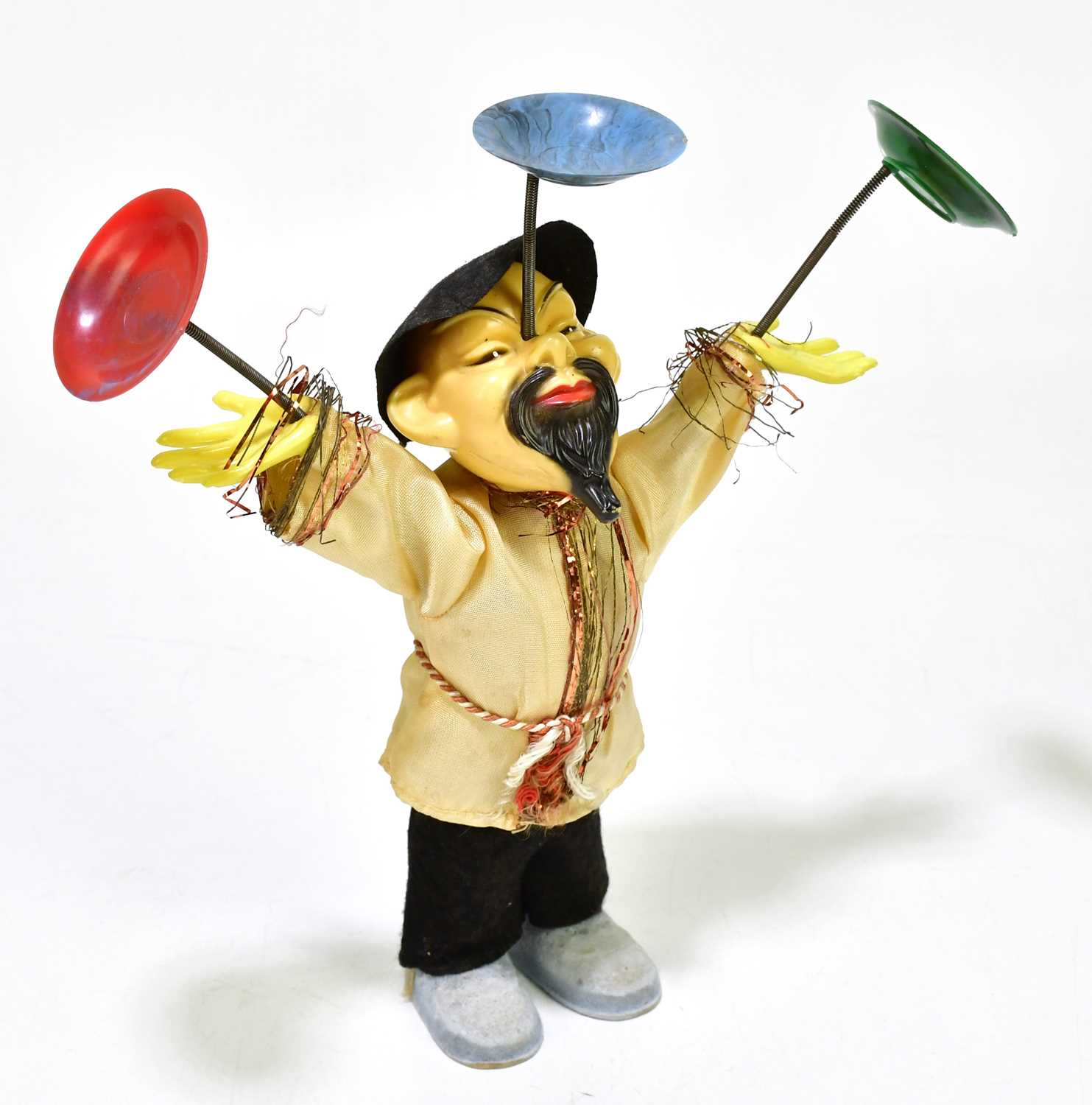 Lot 267 - A Japanese clockwork toy modelled as plate