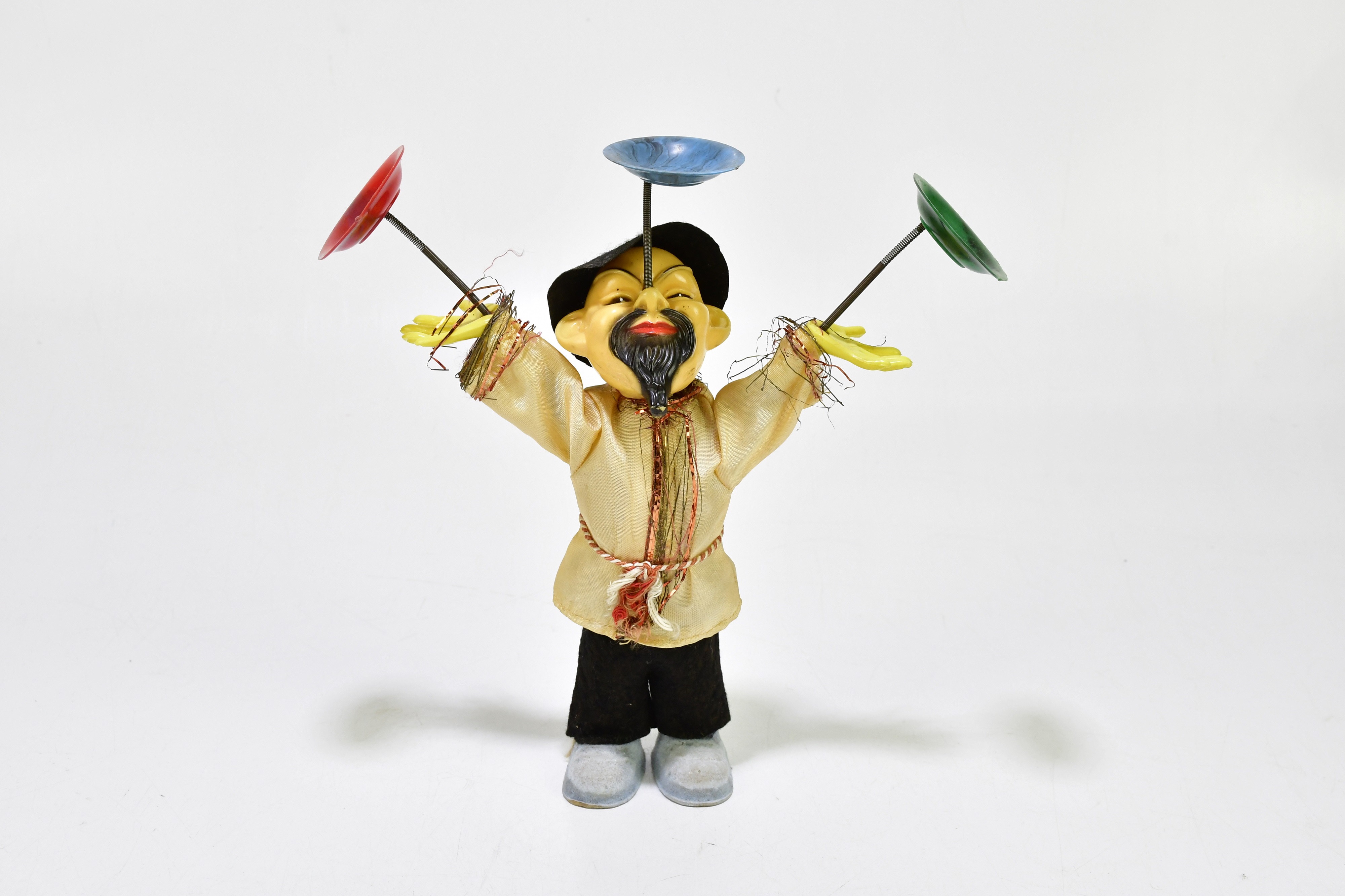 Lot 267 - A Japanese clockwork toy modelled as plate