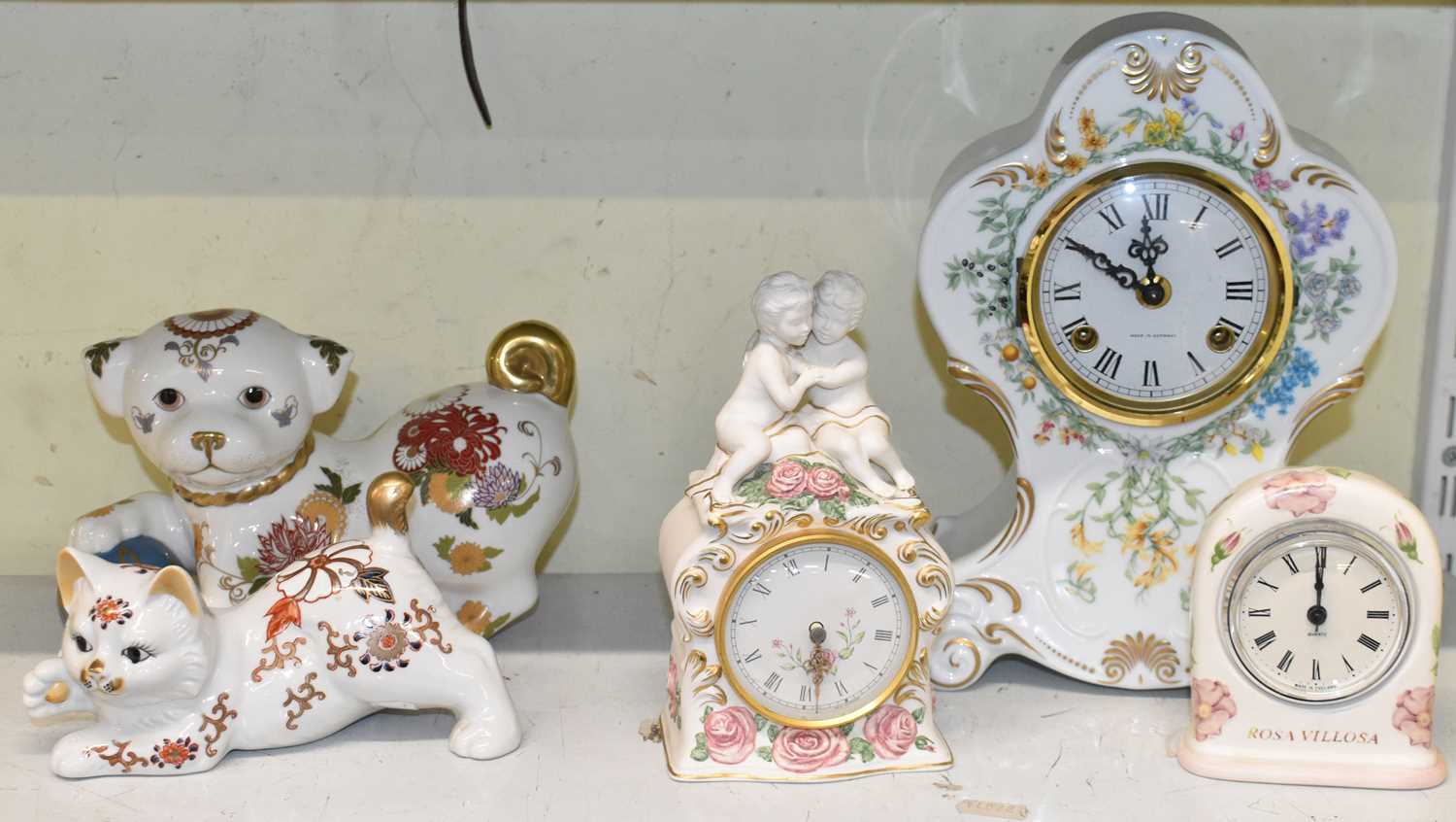 Lot 505 - A modern floral decorated ceramic mantel