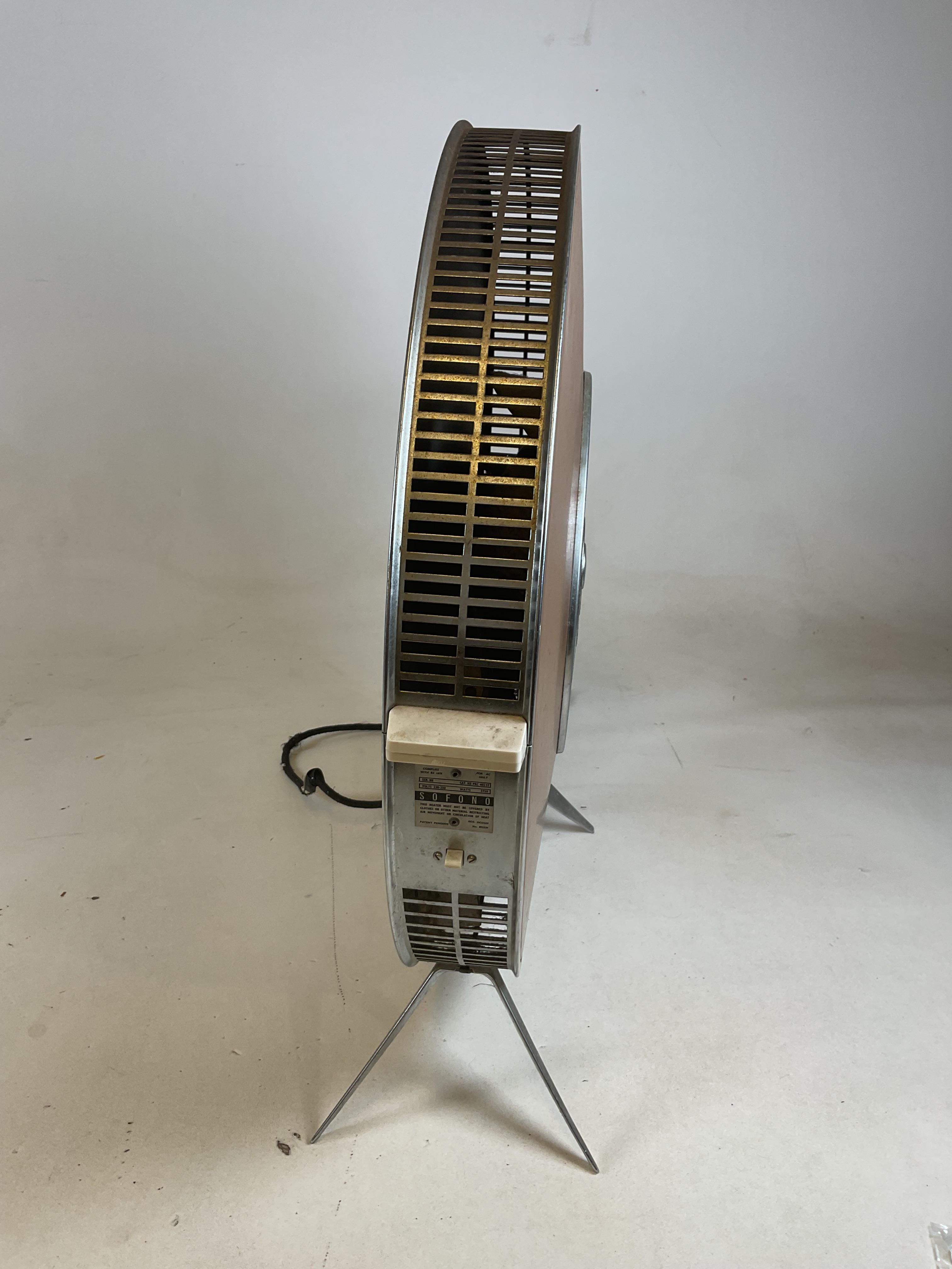 Lot 34 - A mid century circular Atomic space heater,