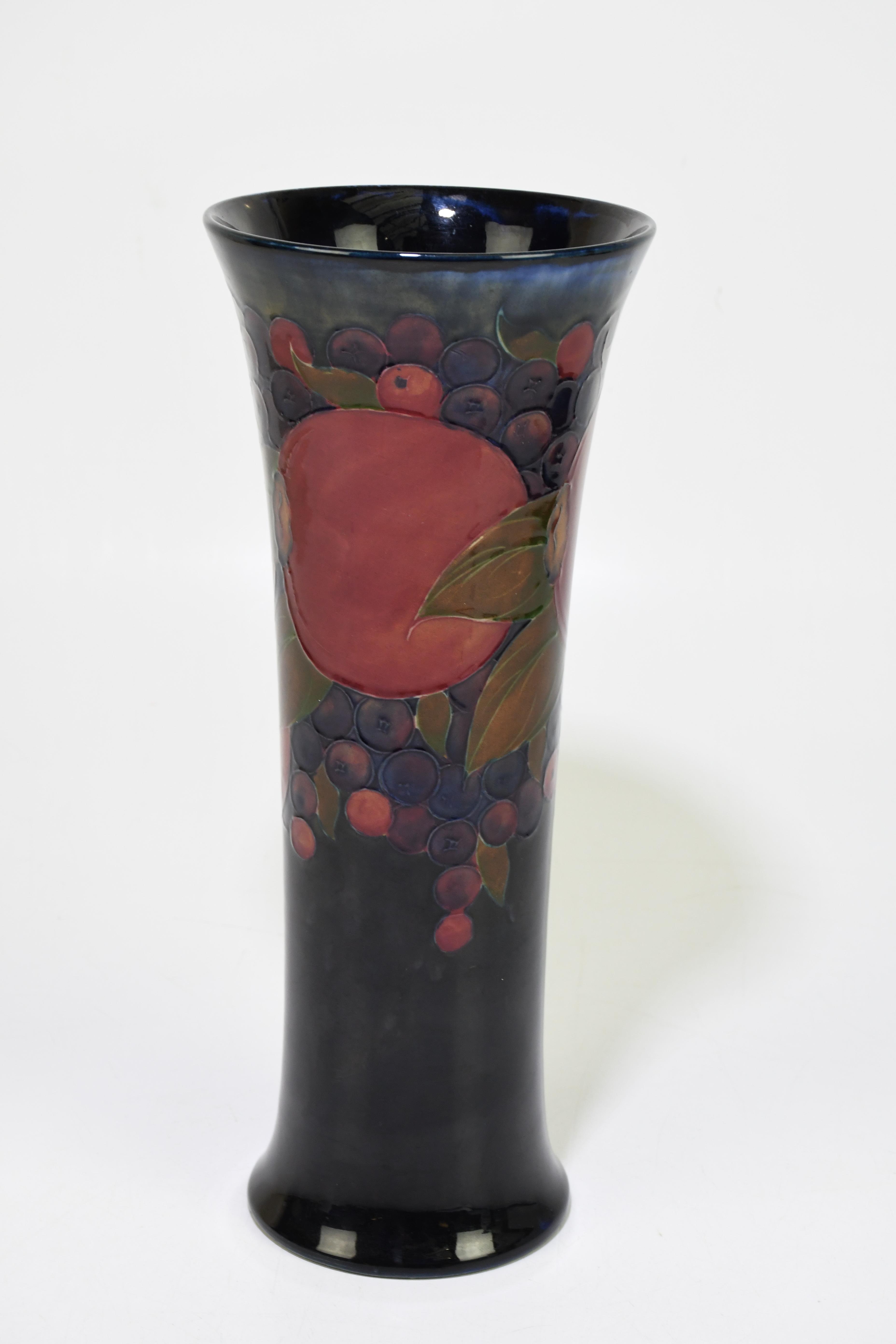 Lot 19 - MOORCROFT; a 'Pomegranate' pattern vase,