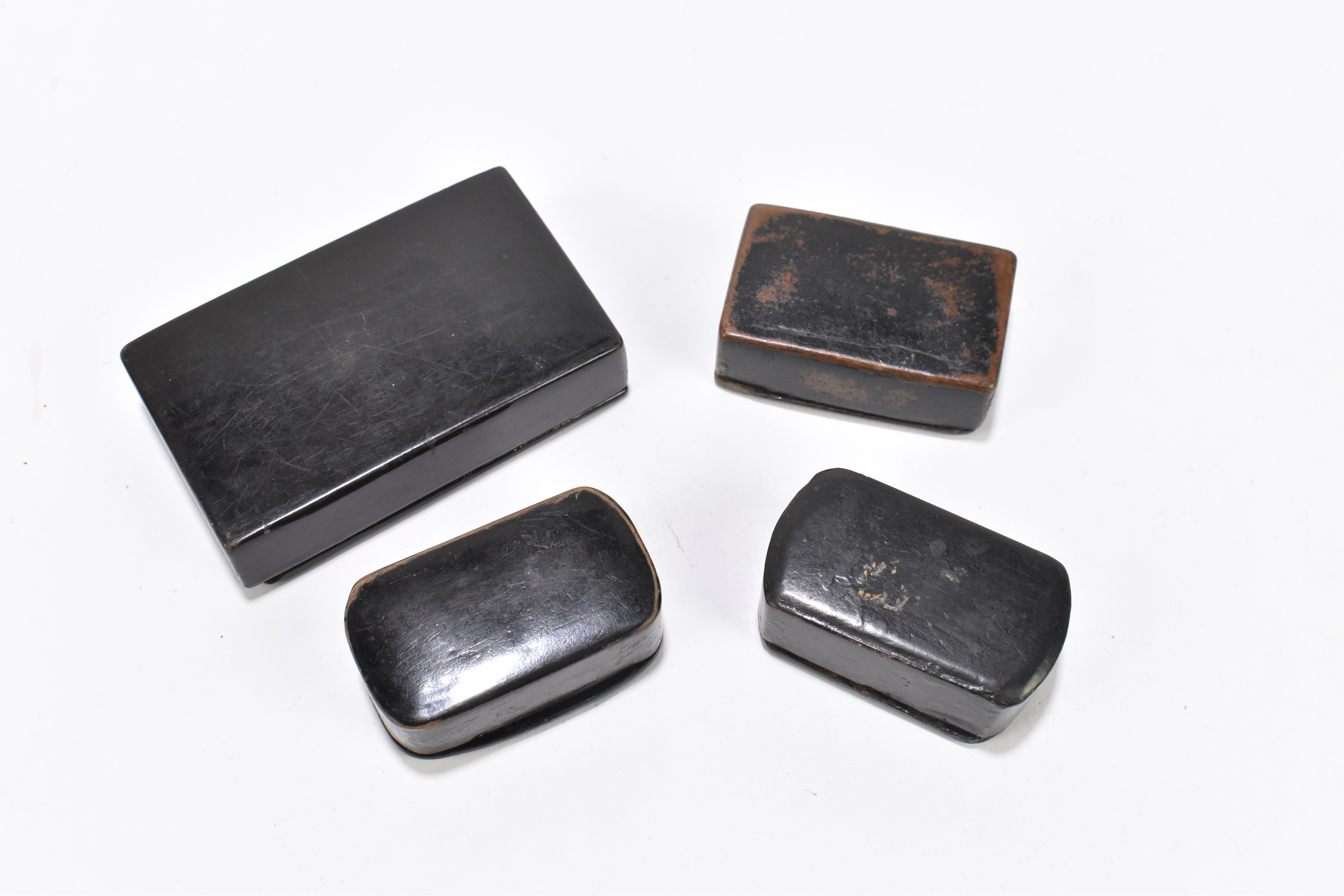 Lot 50 - Four 19th century papier-mâché snuff boxes
