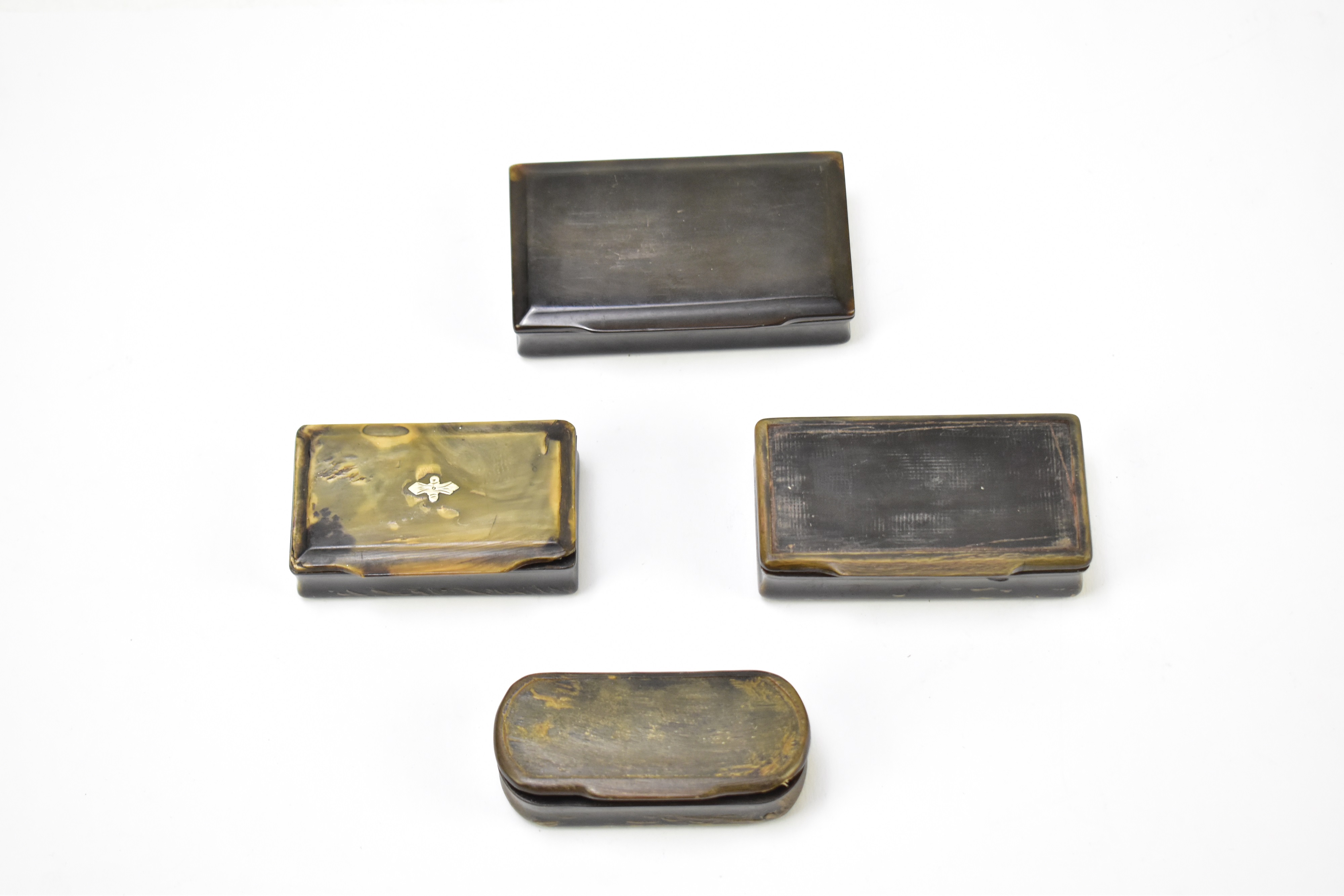 Lot 40 - Four 19th century horn snuff boxes