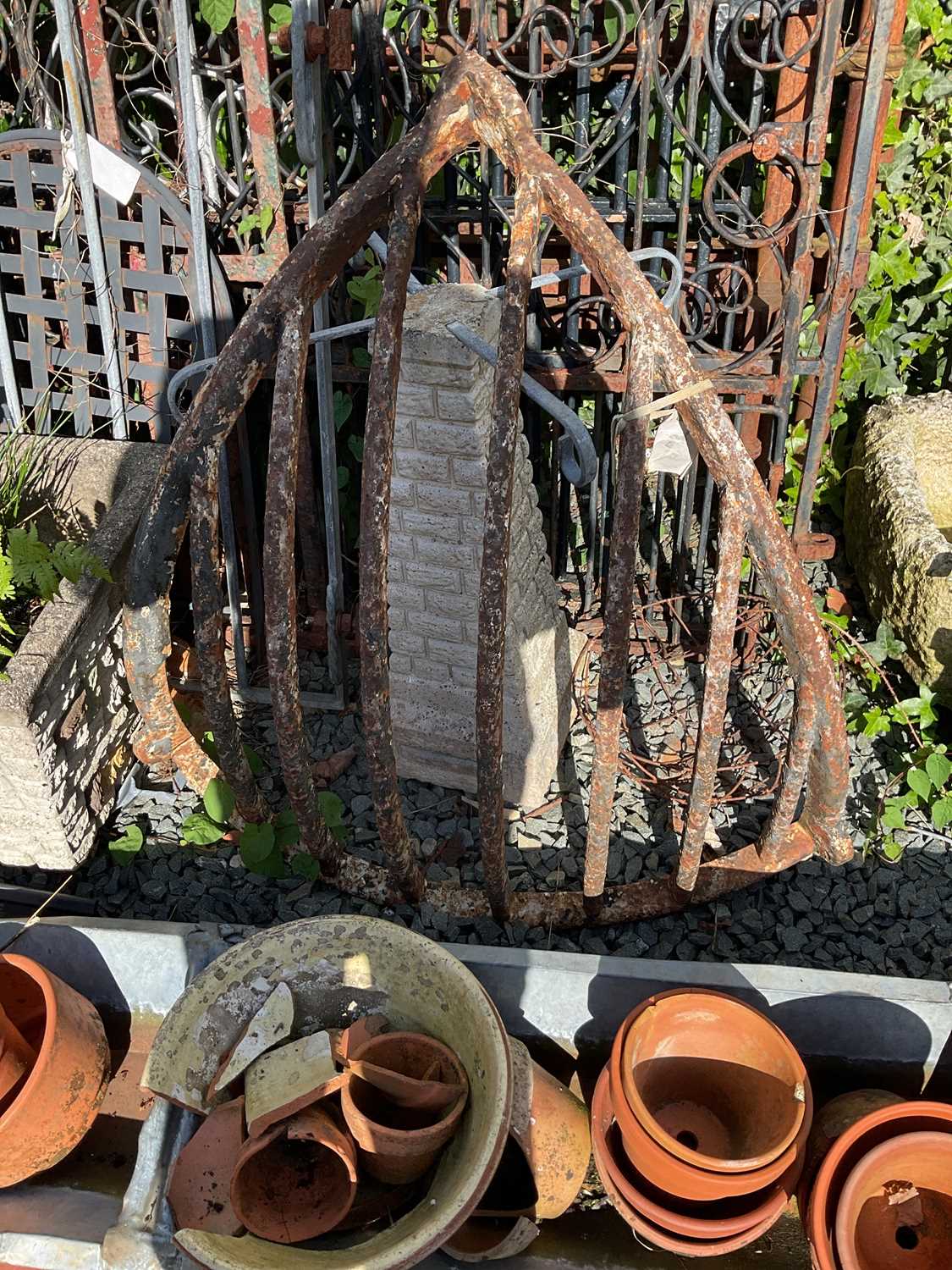 Lot 133 - A large galvanised animal feeder, with a