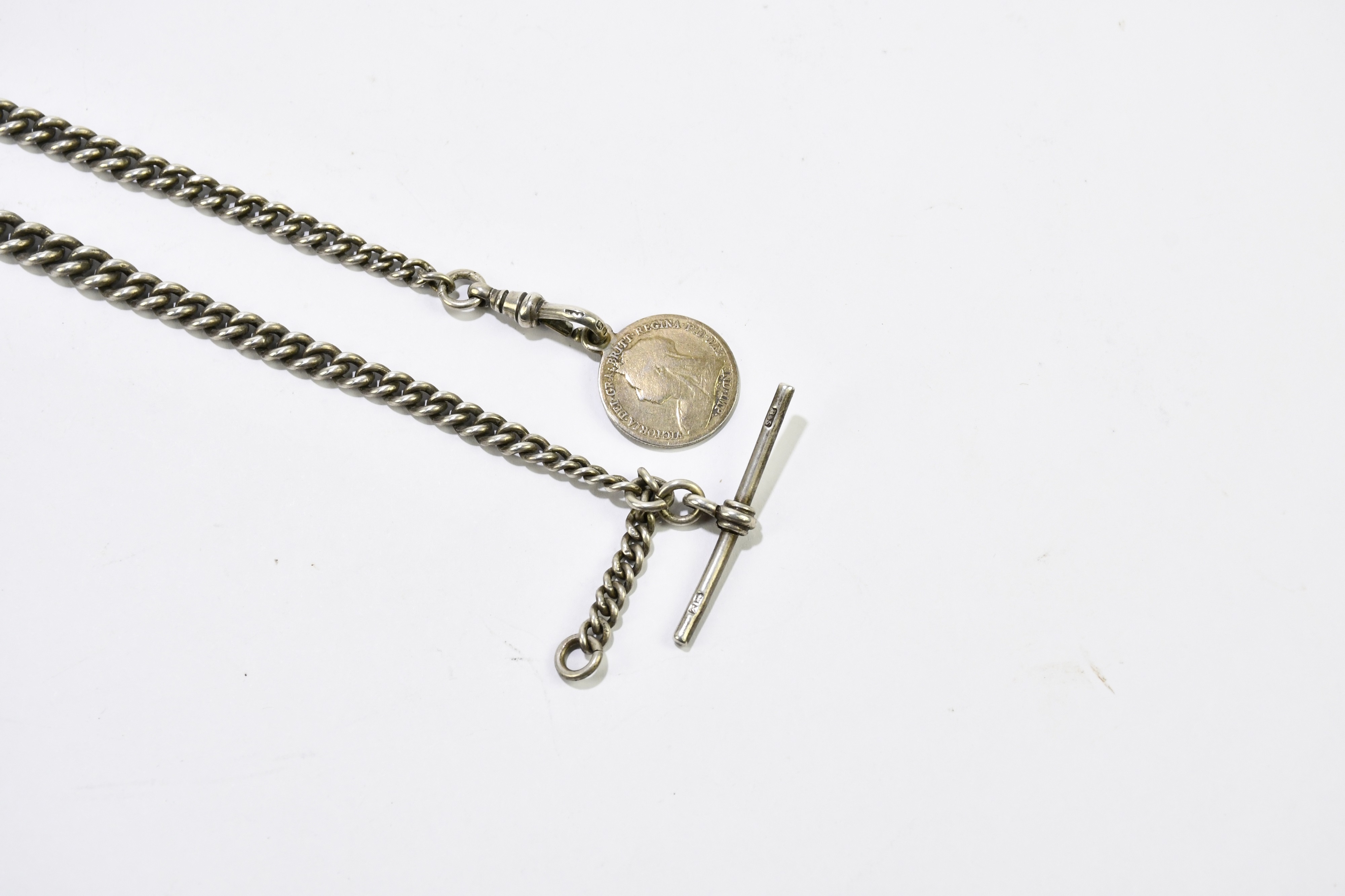 Lot 1353 - A hallmarked silver watch chain, with