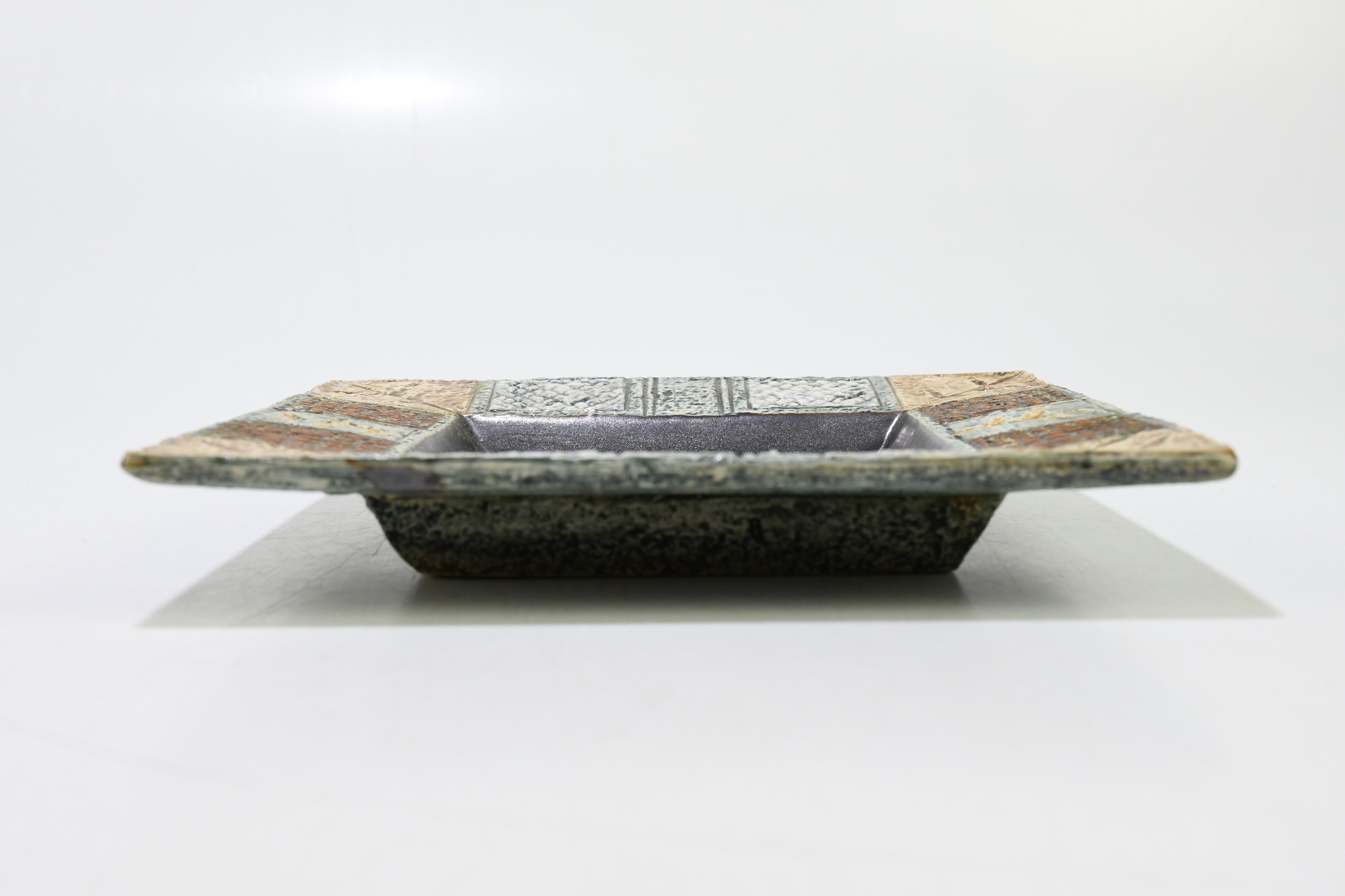 Lot 384 - JANE FITZGERALD FOR TROIKA POTTERY; a square