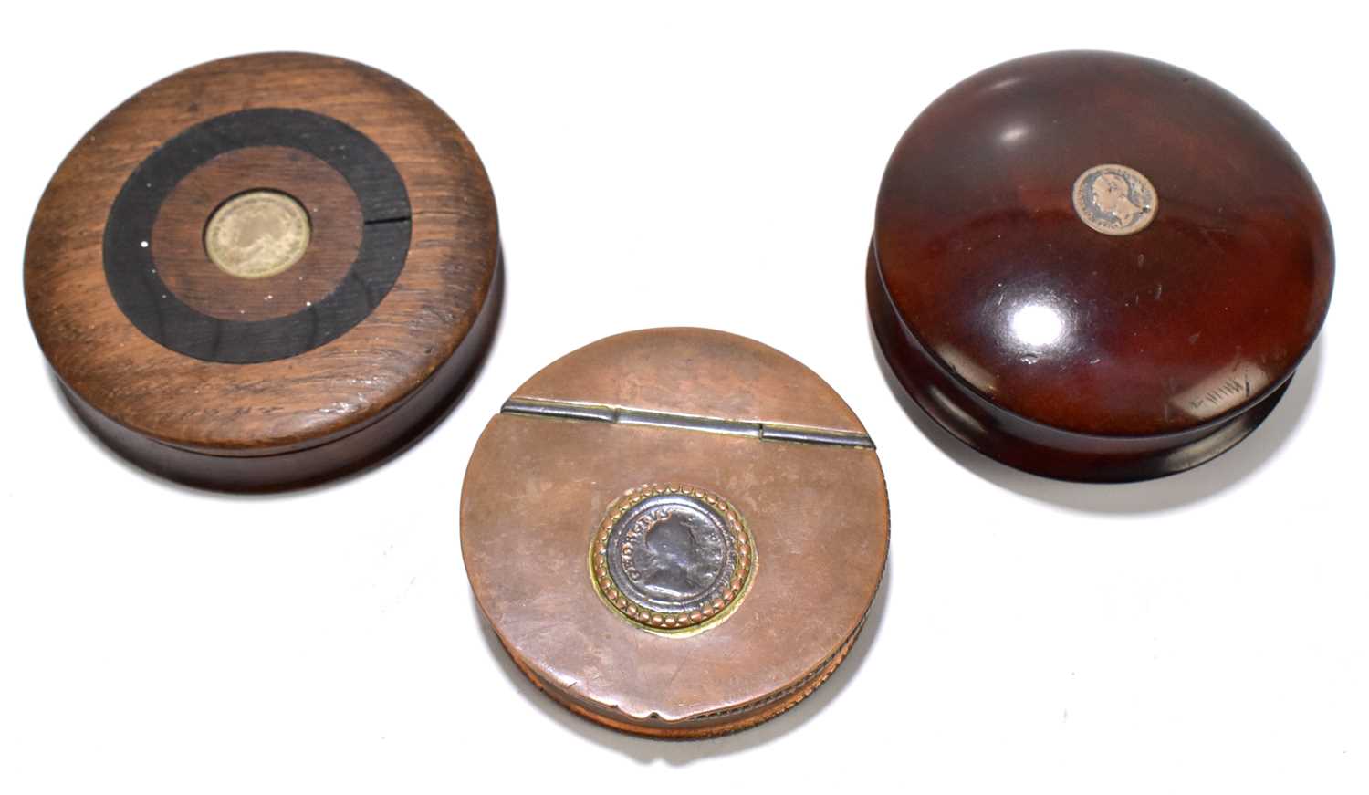 Lot 23 - A 19th century copper snuff box of circular