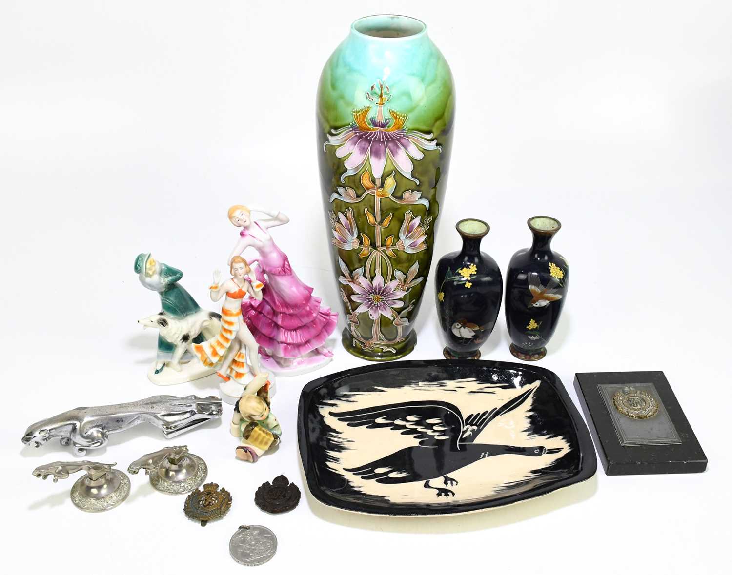 Lot 704 - ERIC LEAPER; a ceramic dish decorated with a