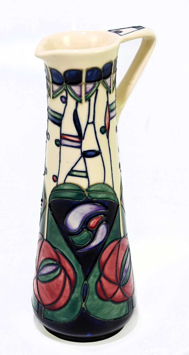 Lot 89 - RACHEL BISHOP FOR MOORCROFT; a ewer decorated