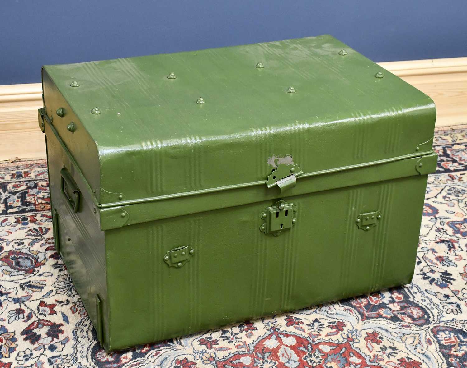 Lot 2407 - A green painted tin trunk, height 47cm,