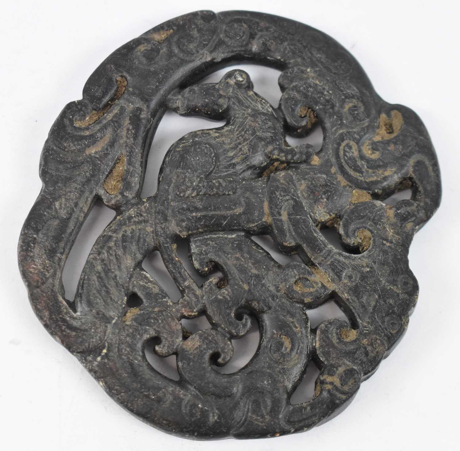 Lot 576 - A small Chinese carved hardstone pierced