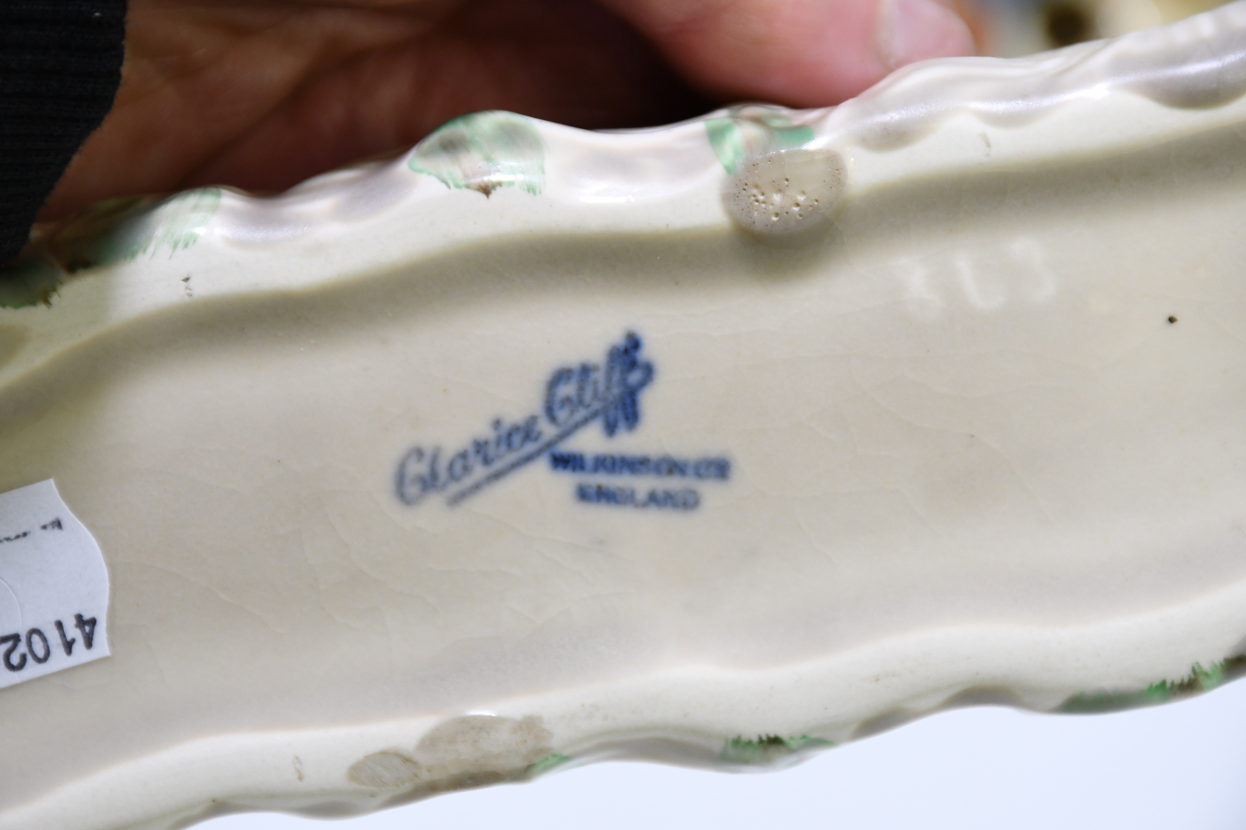 Lot 212 - CLARICE CLIFF; five pieces to include a posy