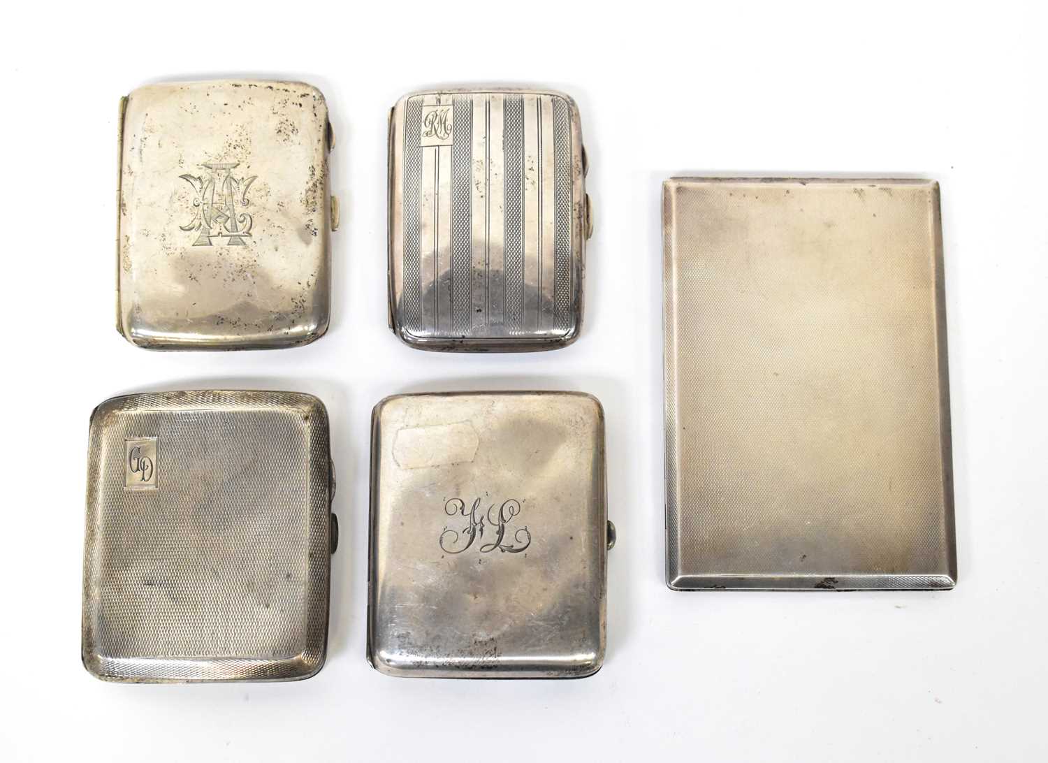 Lot 888 - Five hallmarked silver cigarette cases of
