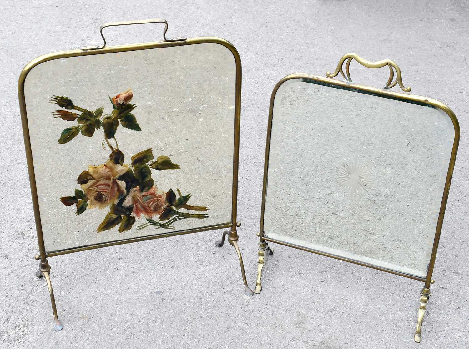 Lot 1169 - Two brass framed mirrored fire screens (2)