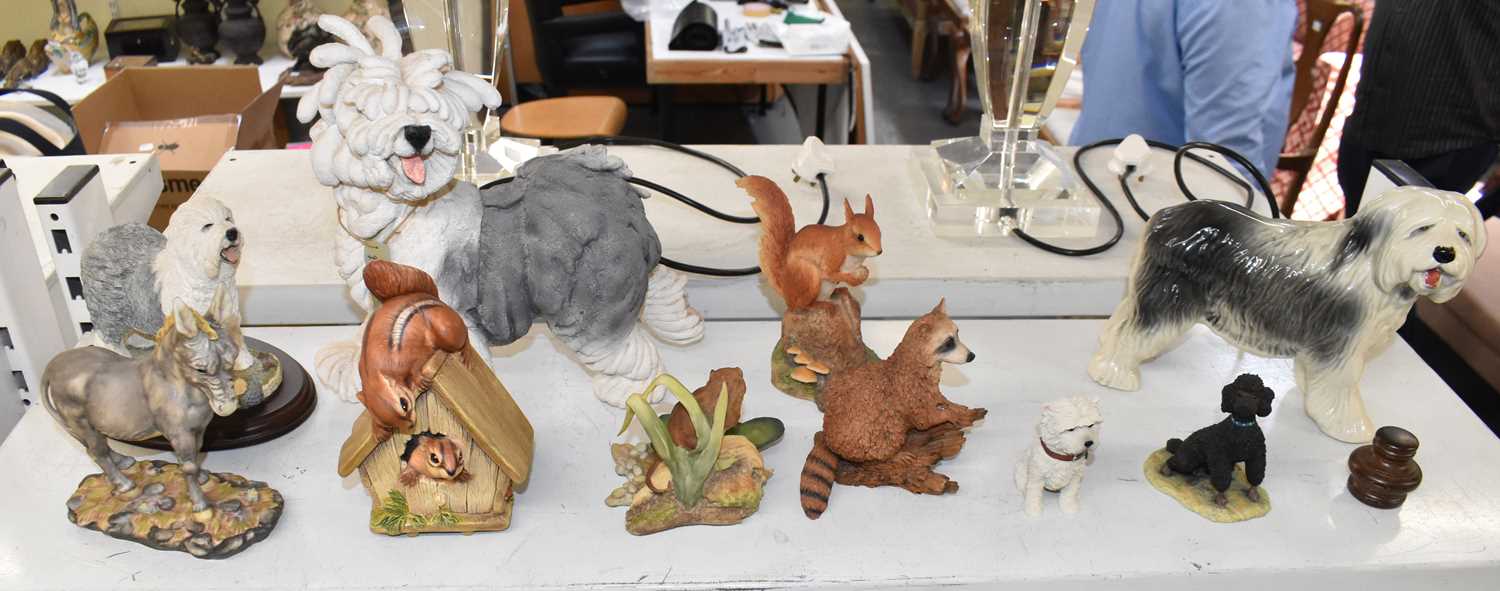 Lot 458 - A group of ten ceramic models of