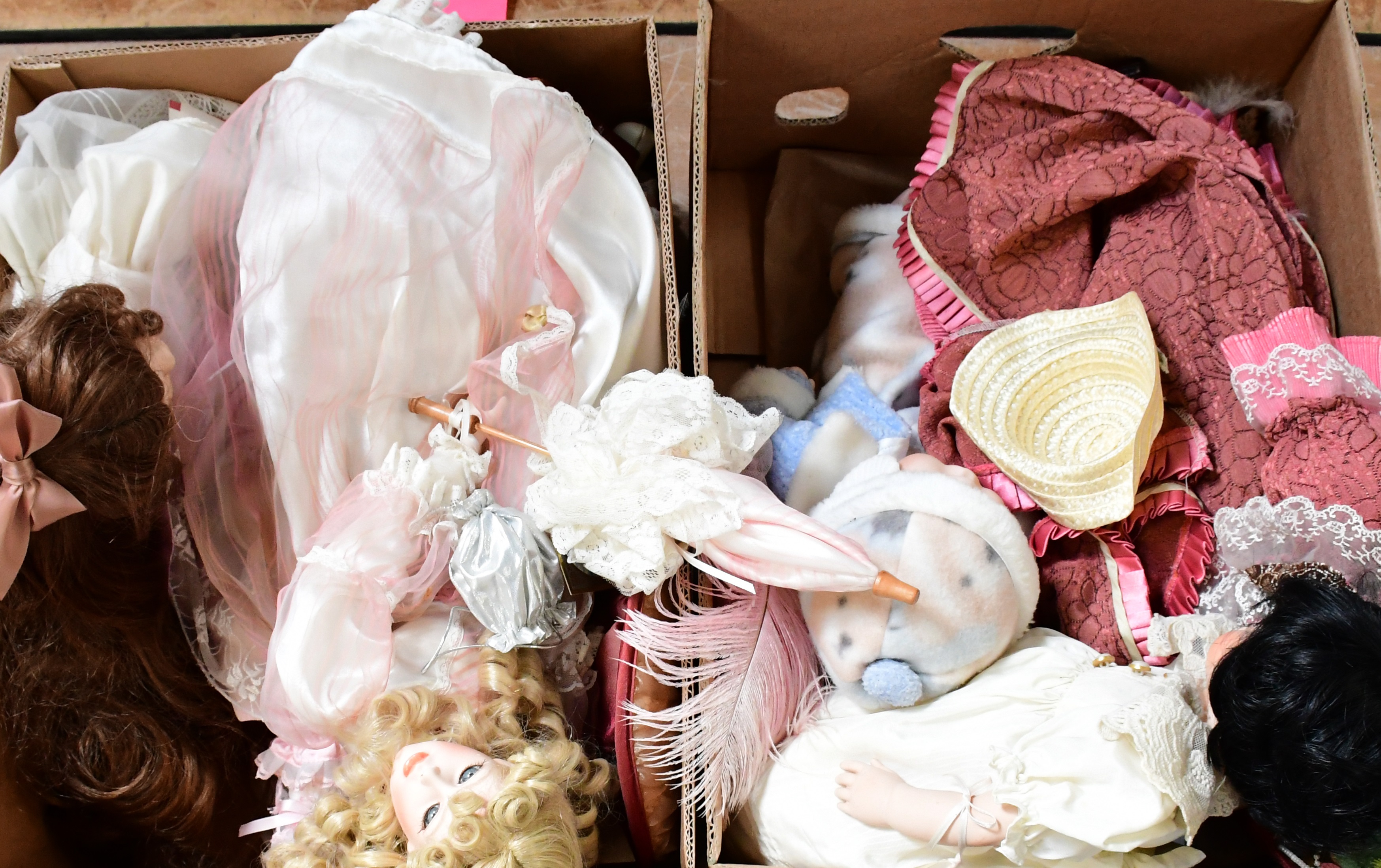 Lot 259 - Ten porcelain costume display dolls, various