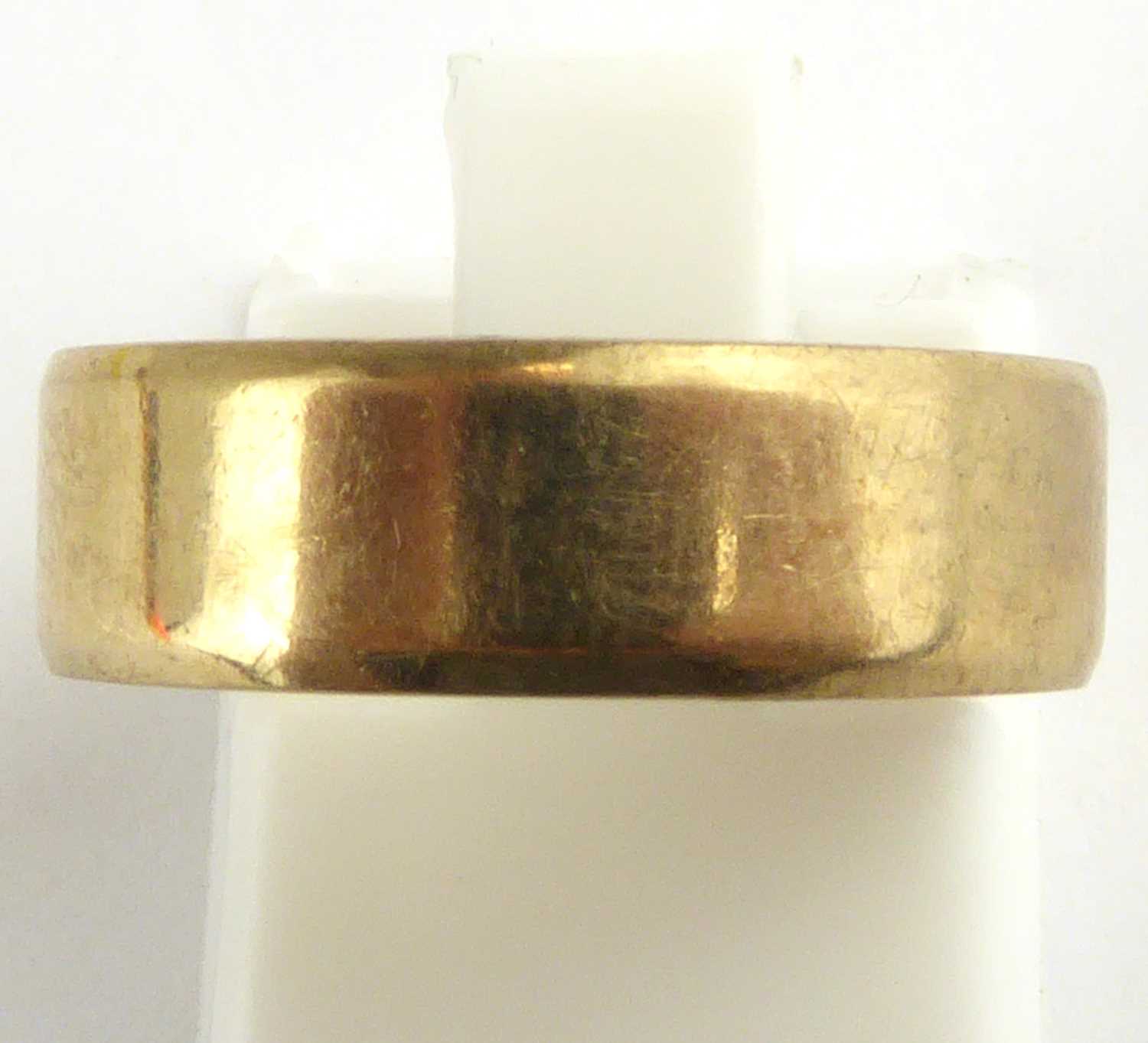 Lot 987 - A 9ct gold band ring, size K, approx. 2.7g.