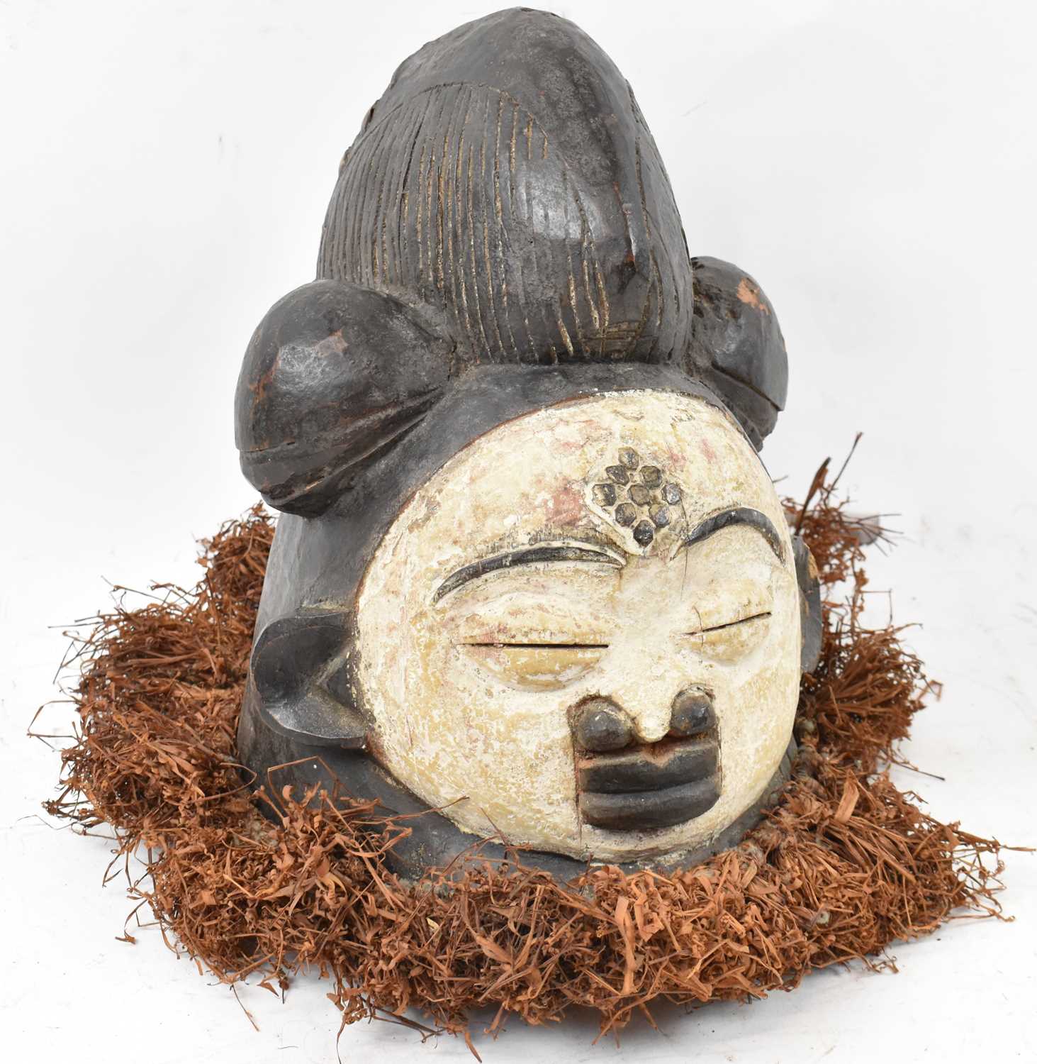 Lot 73 - A Punu, Gabon, dance mask with traces of
