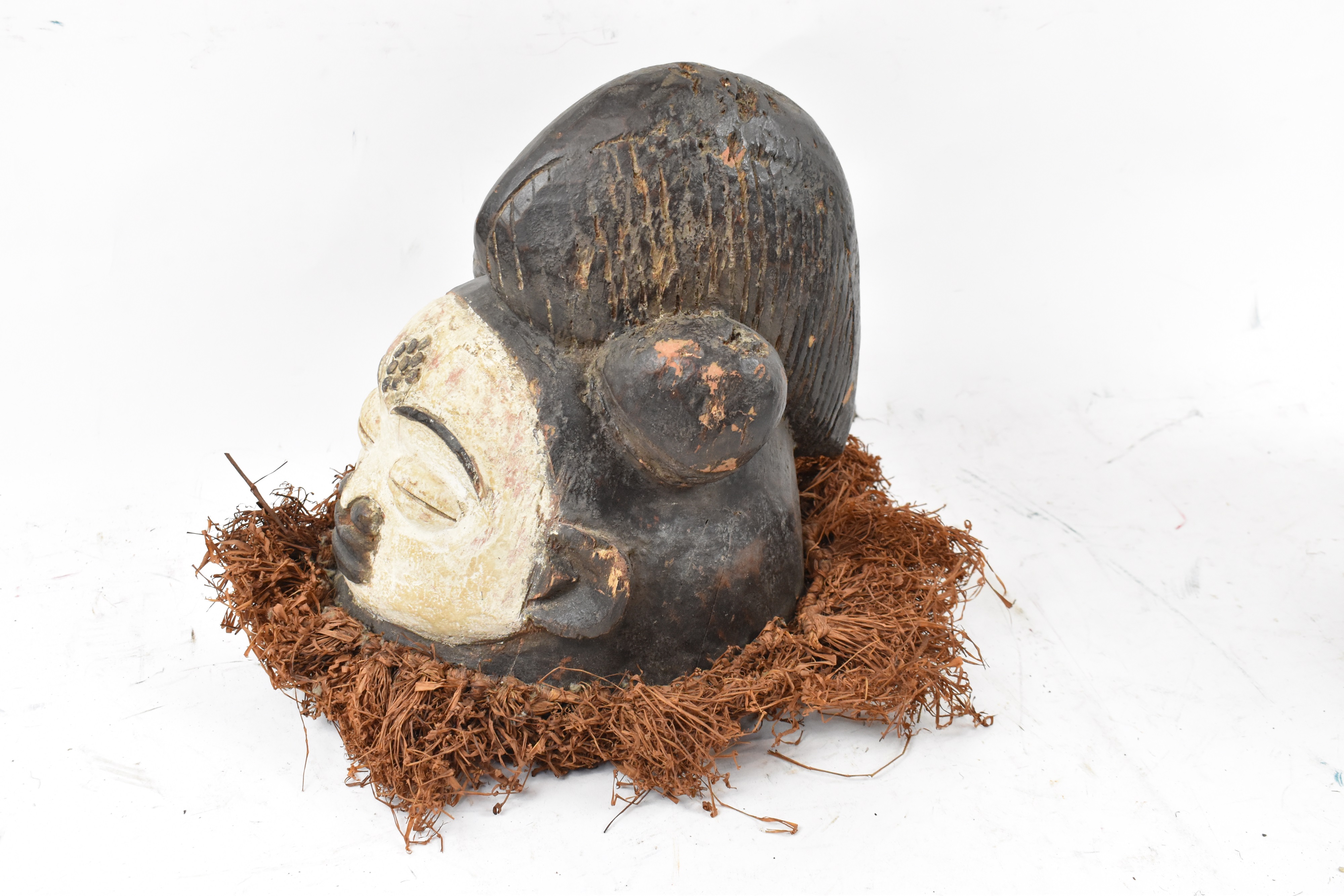 Lot 73 - A Punu, Gabon, dance mask with traces of