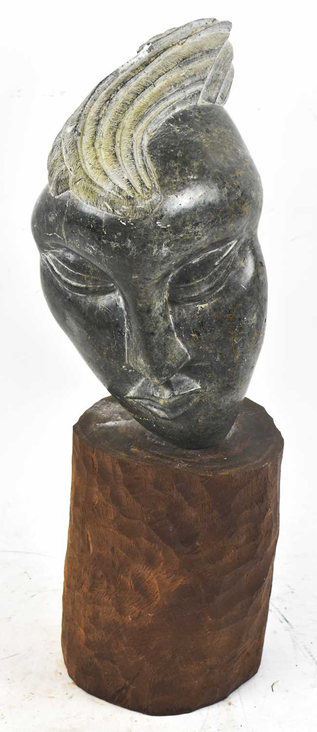 Lot 113 - A contemporary African carved stone