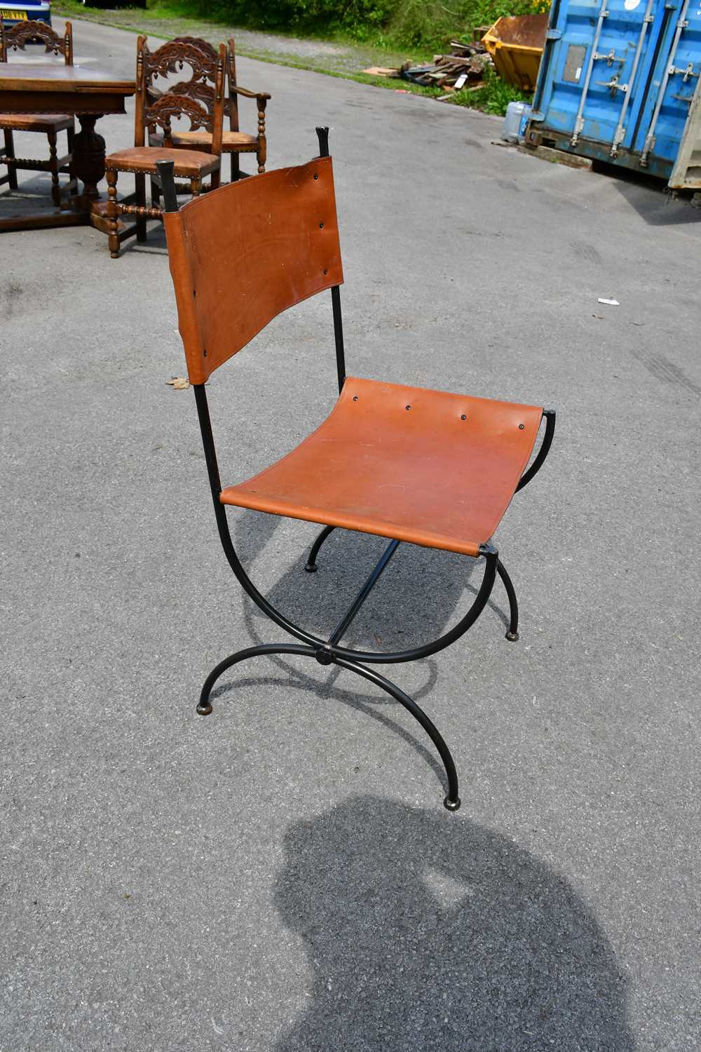 Lot 2606 - Six cast metal X-frame chairs with leather