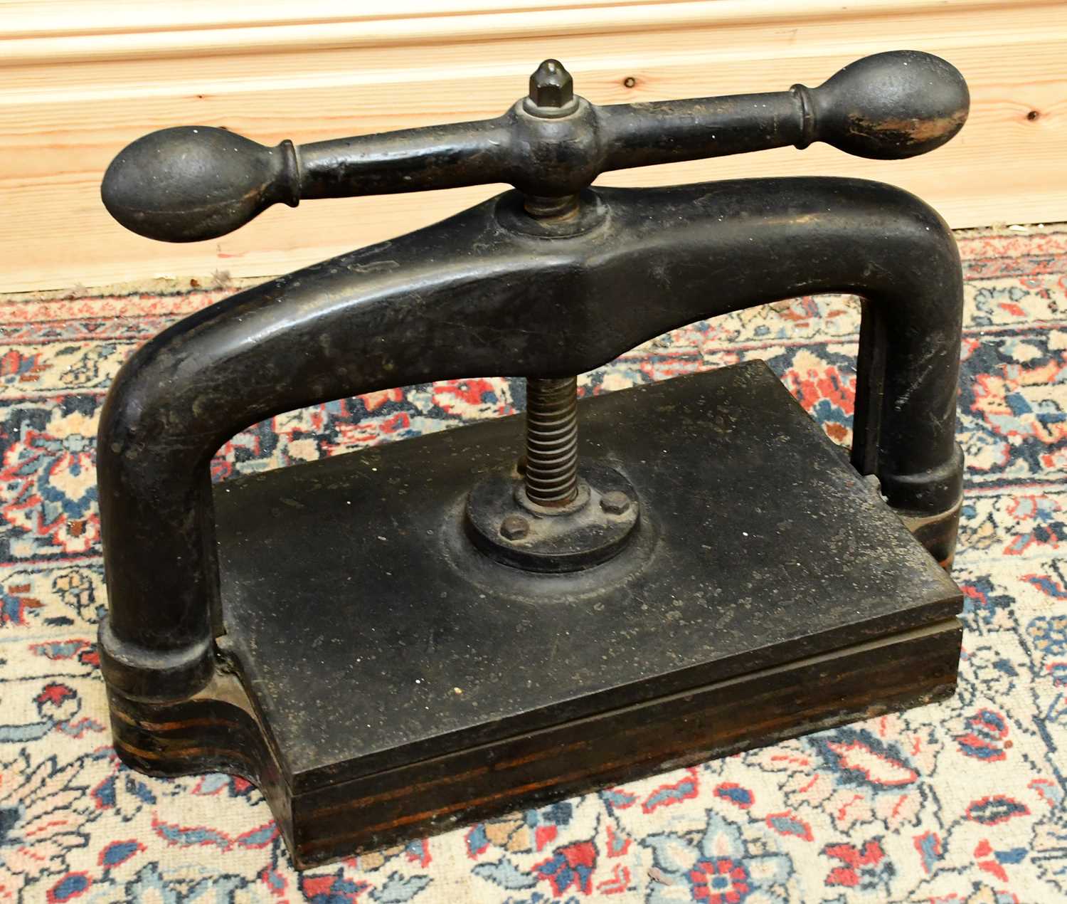 Lot 1087 - A Victorian cast iron book press, width