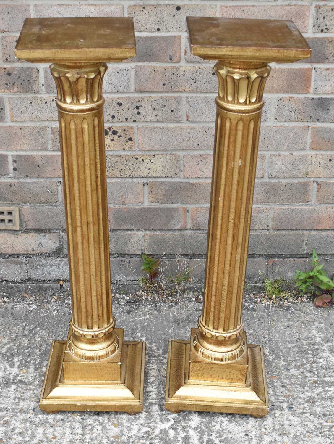 Lot 58 - A pair of 20th century giltwood columns,