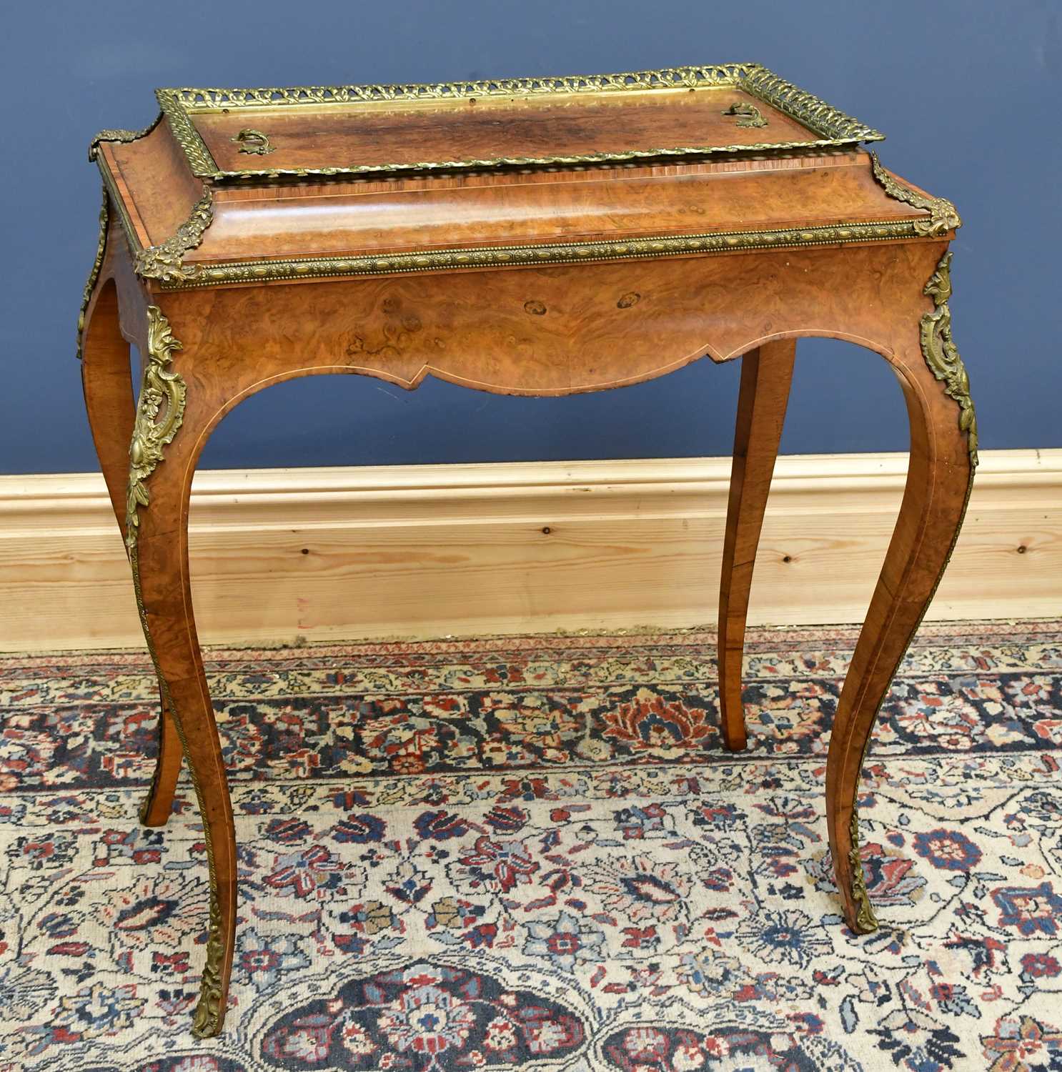 Lot 1531 - A French Louis XV style burr walnut gilt