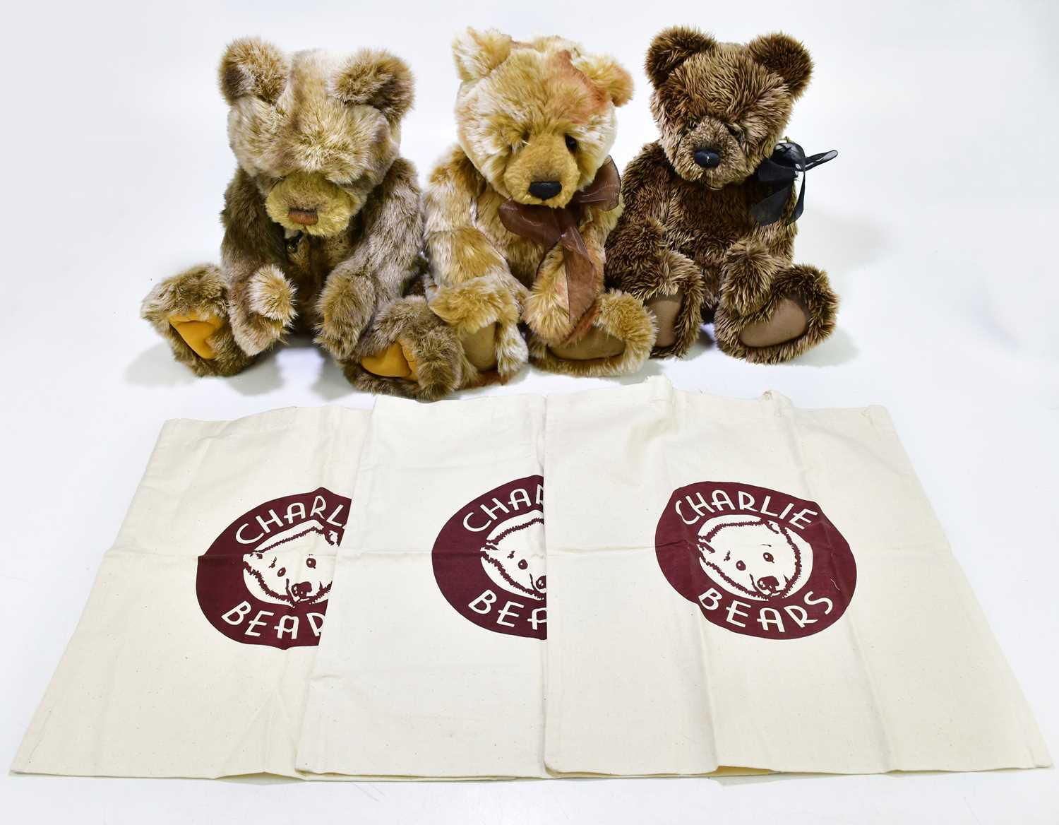 Lot 114 - CHARLIE BEARS; three teddy bears comprising